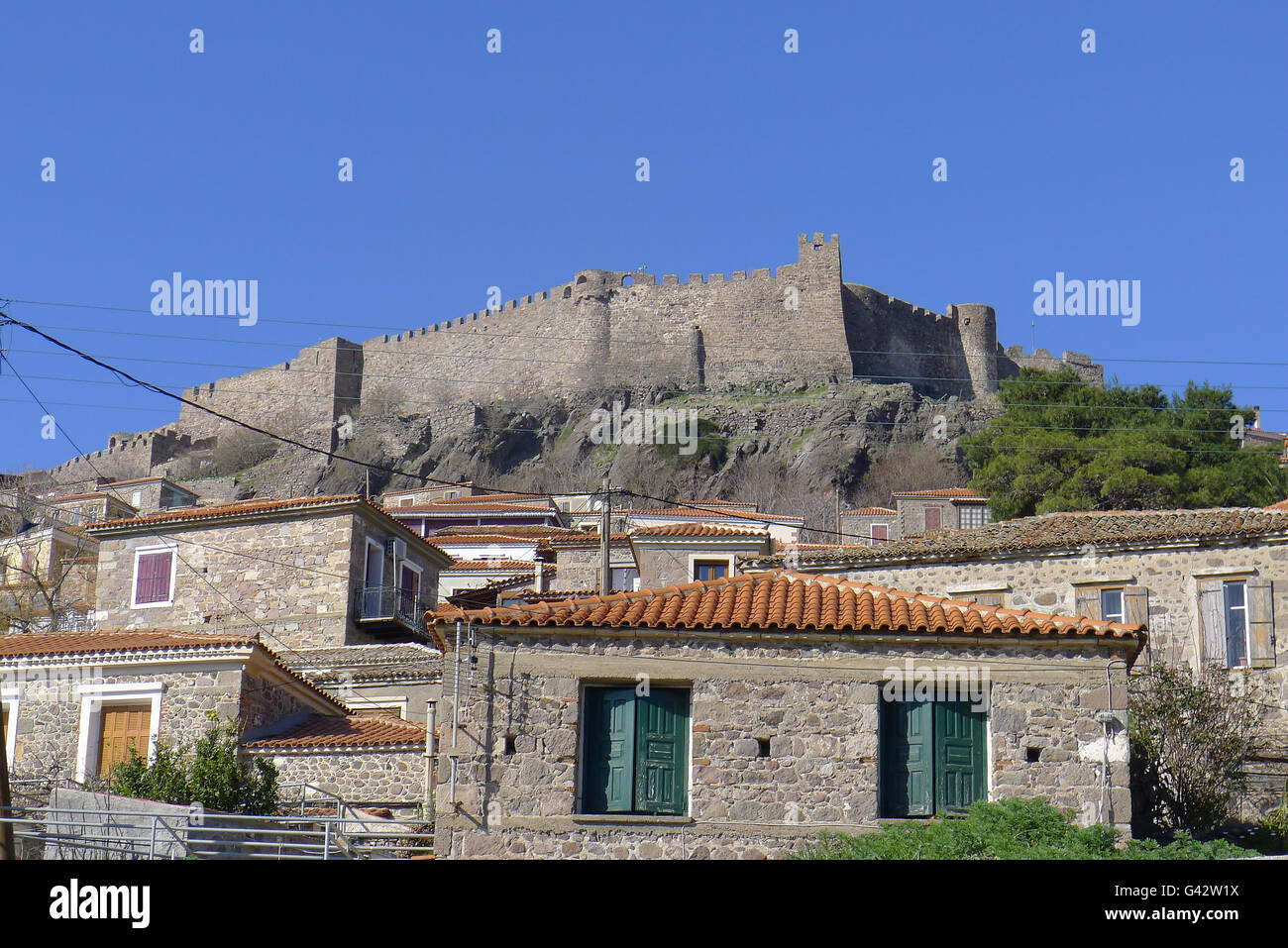 Beautiful Molivos castle in blue sky at Lesvos Greece Stock Photo - Alamy