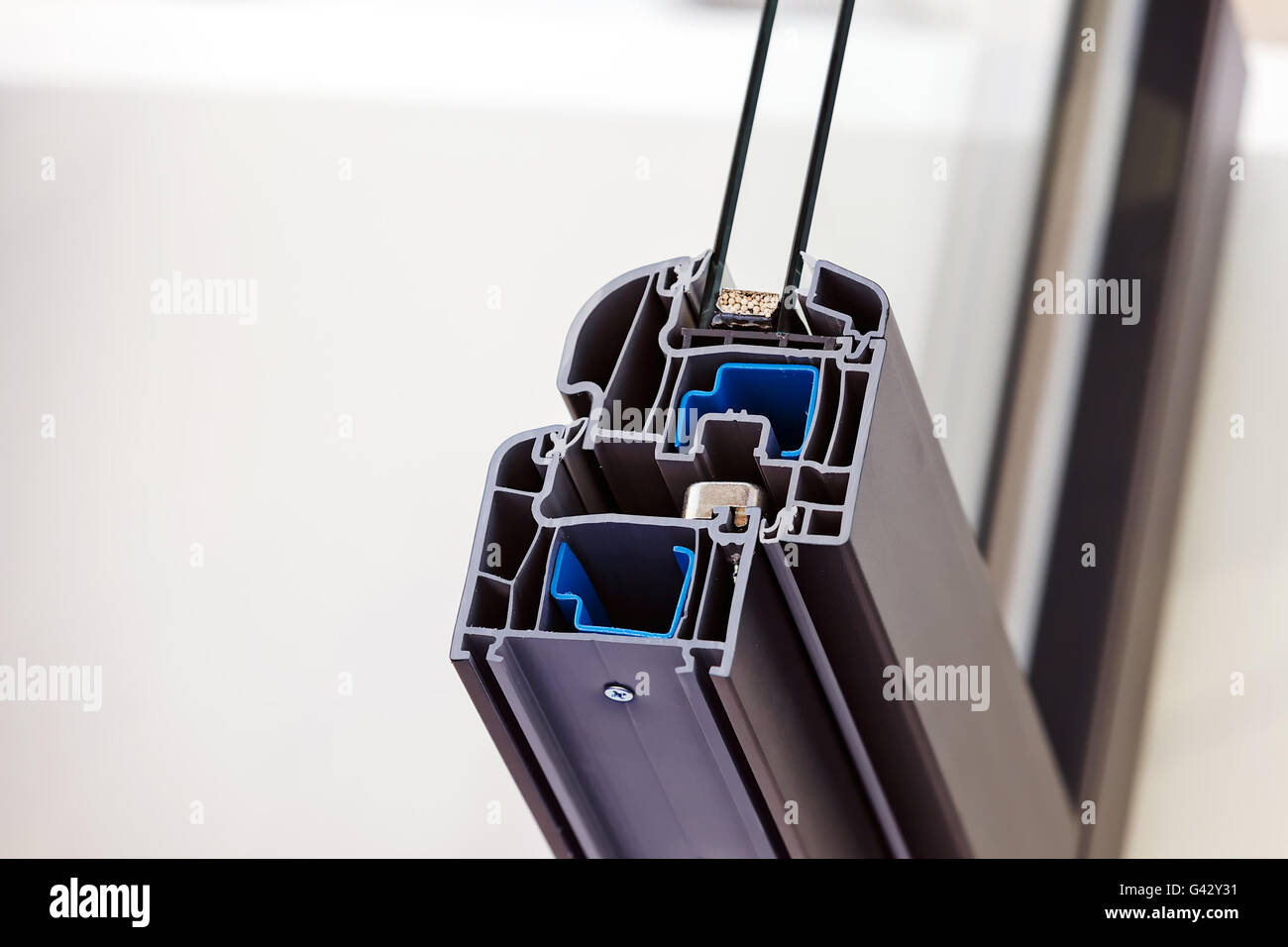 Window profile cut of with metal, glass and insulation Stock Photo - Alamy