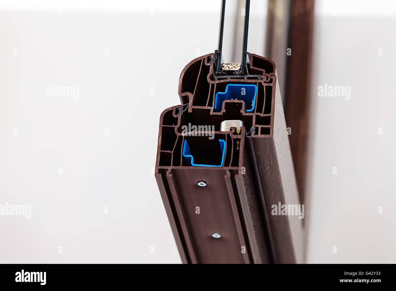 Window profile cut of with metal, glass and insulation Stock Photo - Alamy