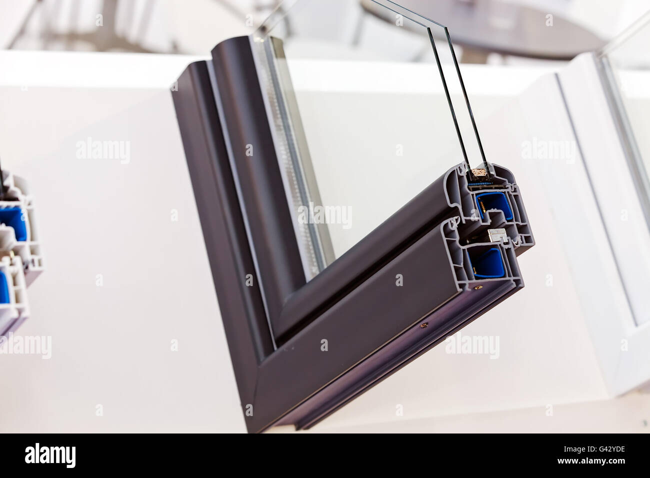 Window profile cut of with metal, glass and insulation Stock Photo - Alamy