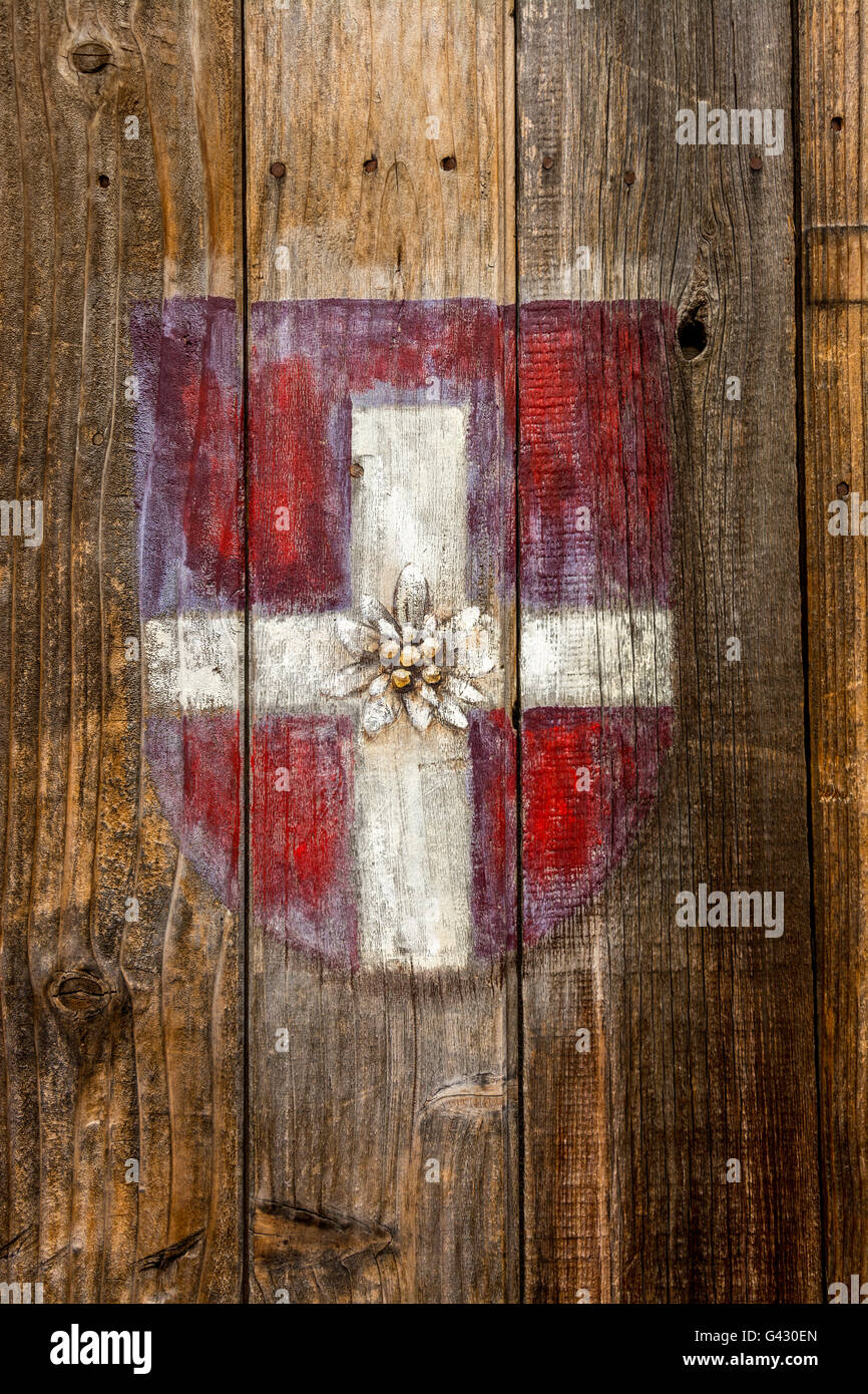 Coat of arms of Savoy on a wooden door, Haute Savoie, French Alps ...
