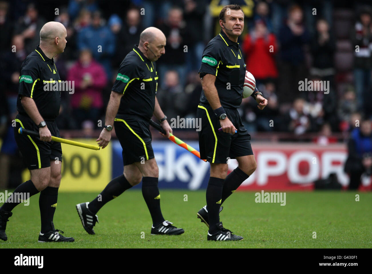 Martin cryans and refere mike tumilty walk onto the pitch hi-res stock ...