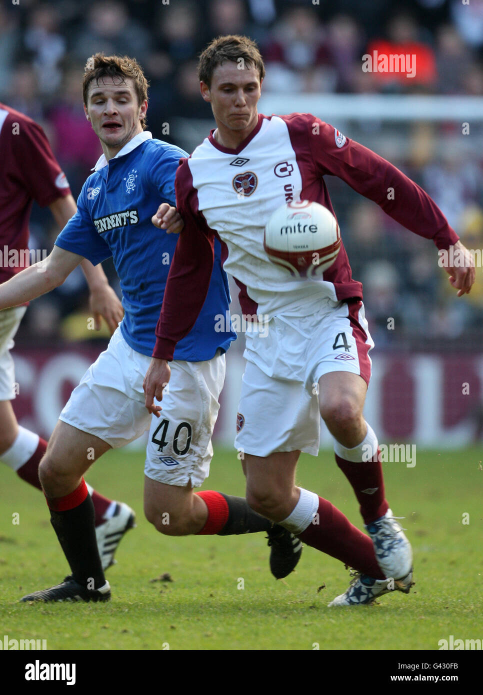 Rangers' Jamie Ness (left) and Heart of Midlothian's Eggert Jonsson ...