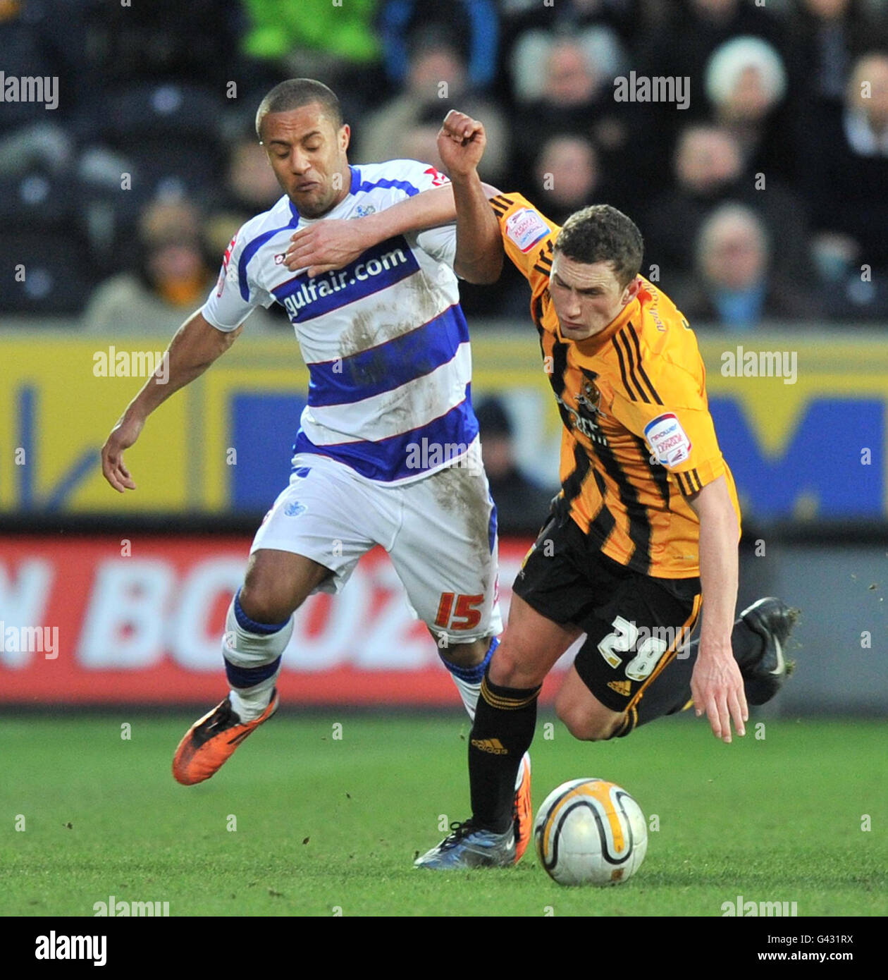 Queens Park Ranger's Wayne Routledge and Hull City's Corry Evans during ...
