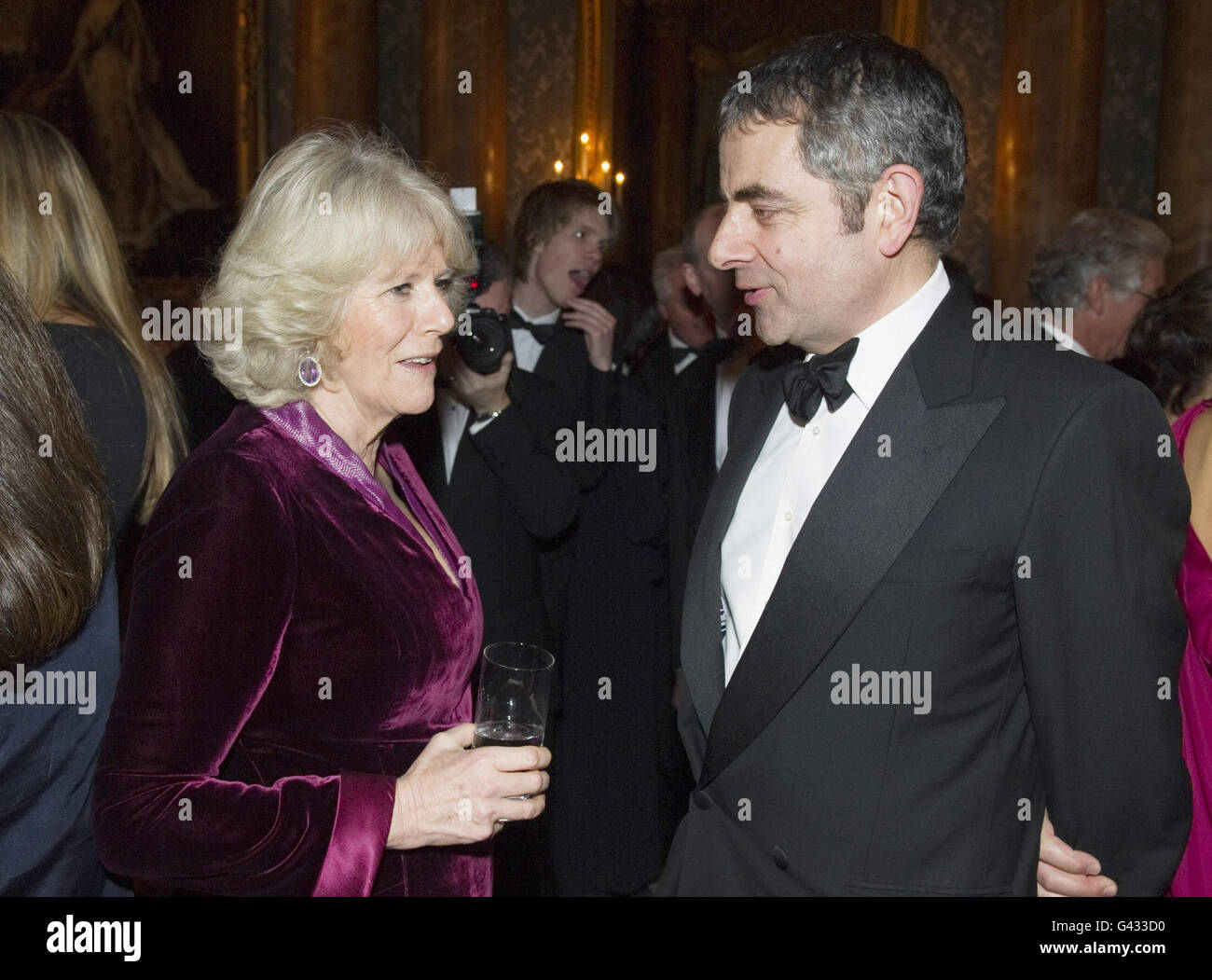 The Duchess of Cornwall with Rowan Atkinson as they attended a gala ...