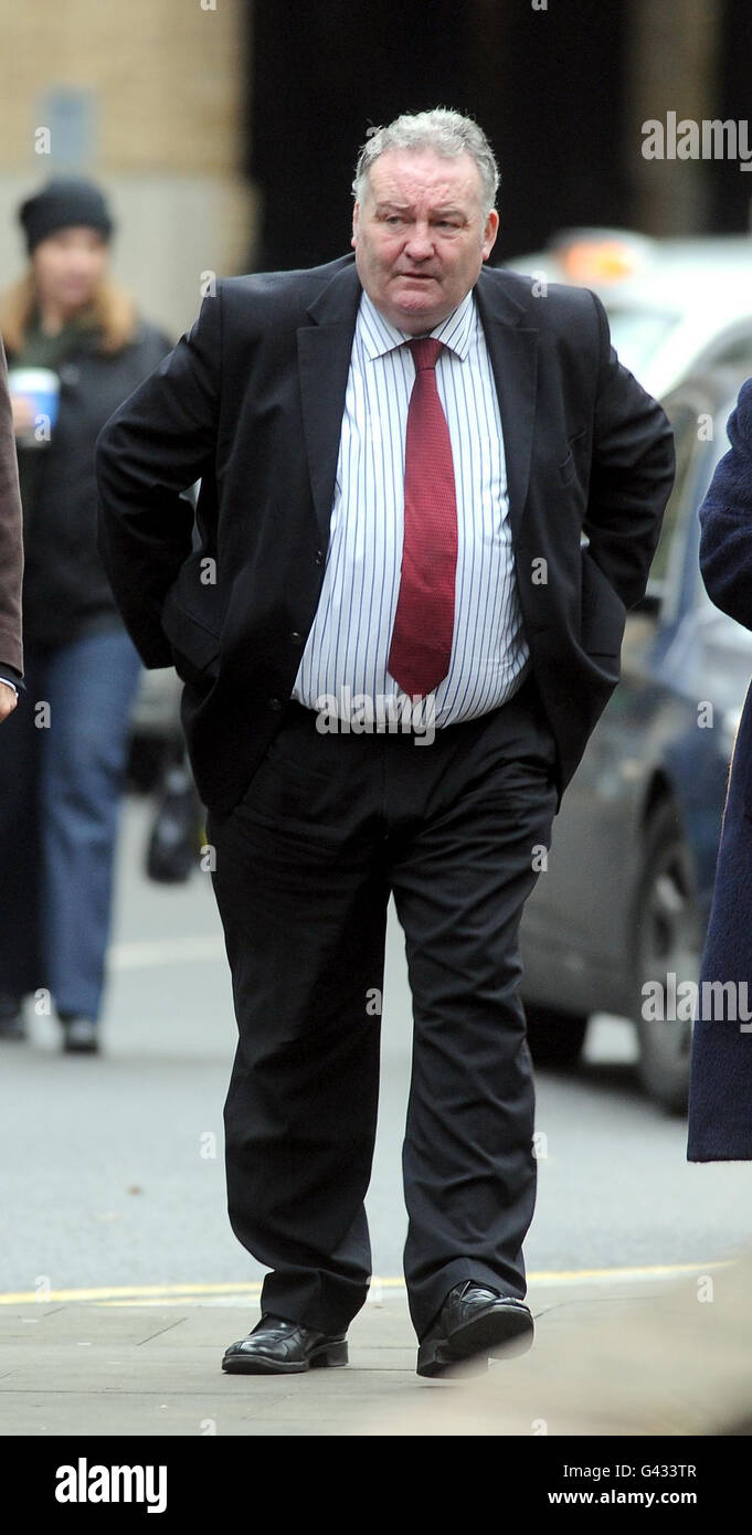 Former Labour MP Jim Devine arrives at Southwark Crown Court, where he ...