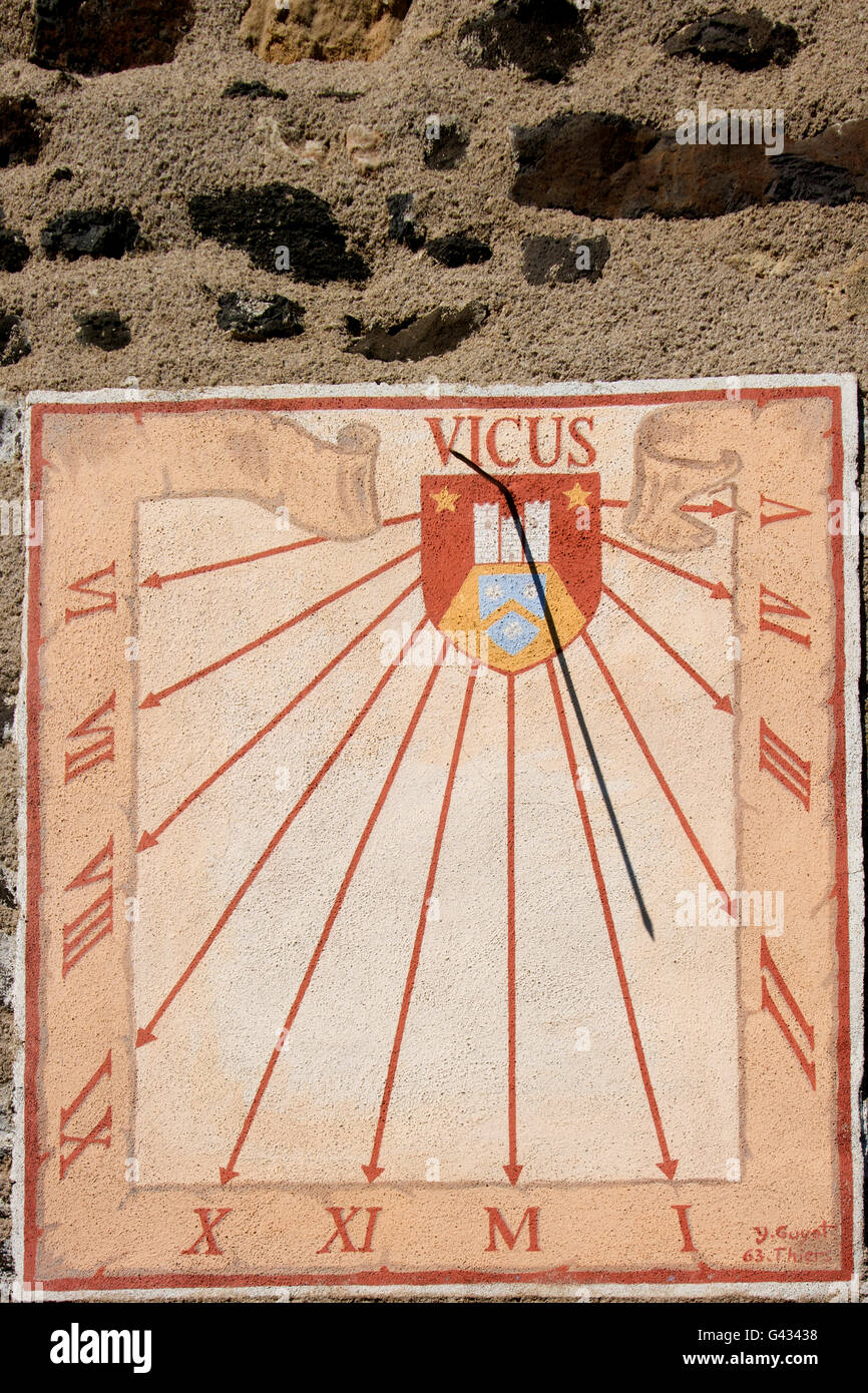 Sun dial on historic wall showcasing time with shadow in ancient ...