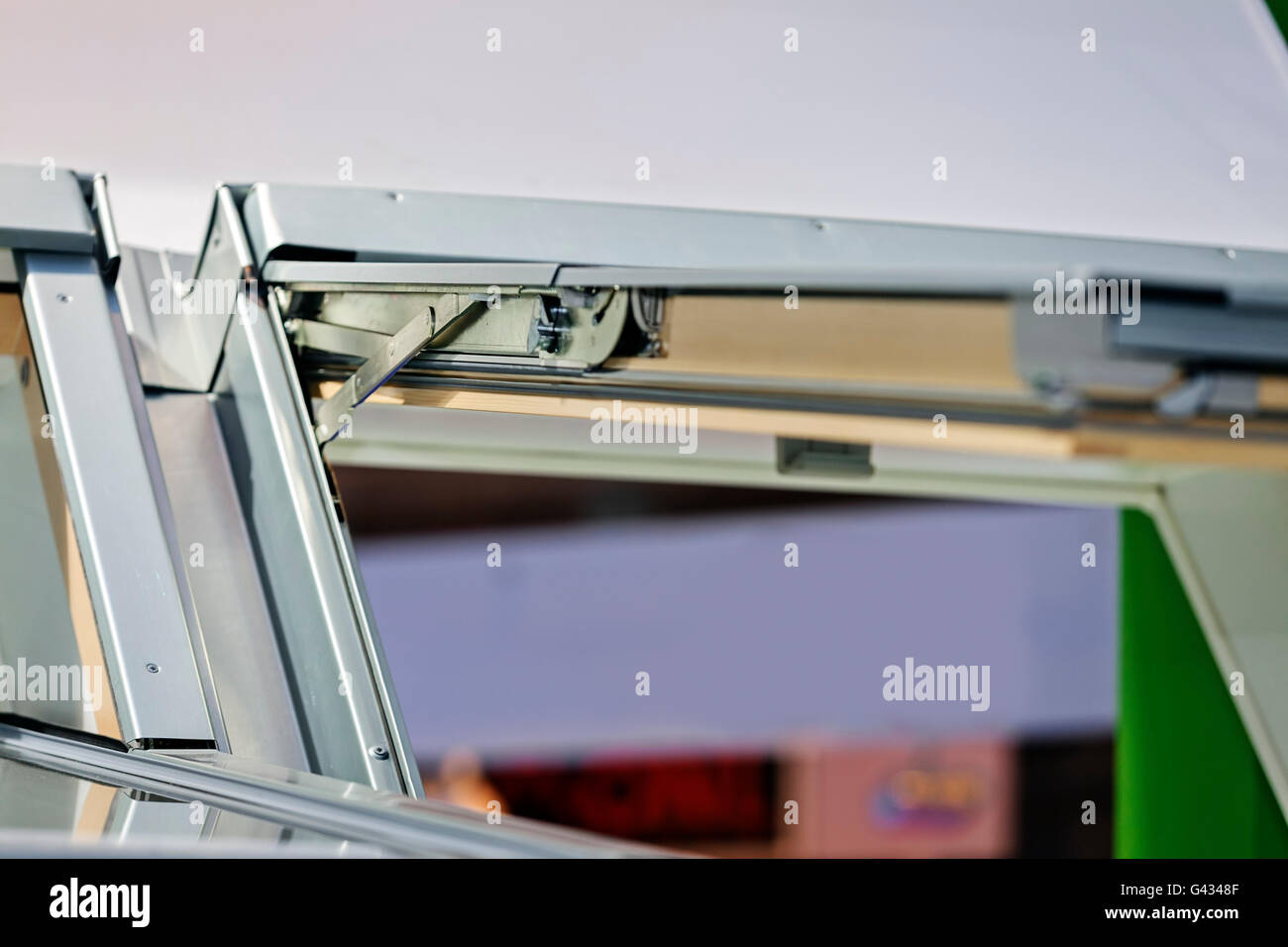 Open roof window mechanism, outside view; note shallow depth of field ...