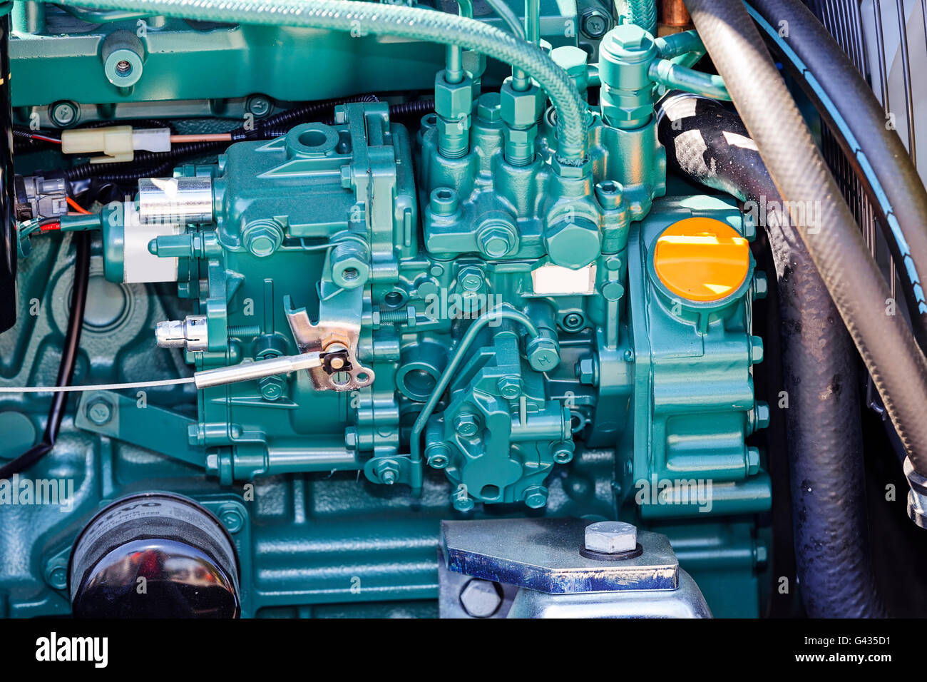 View on motor of new excavator digging Stock Photo - Alamy