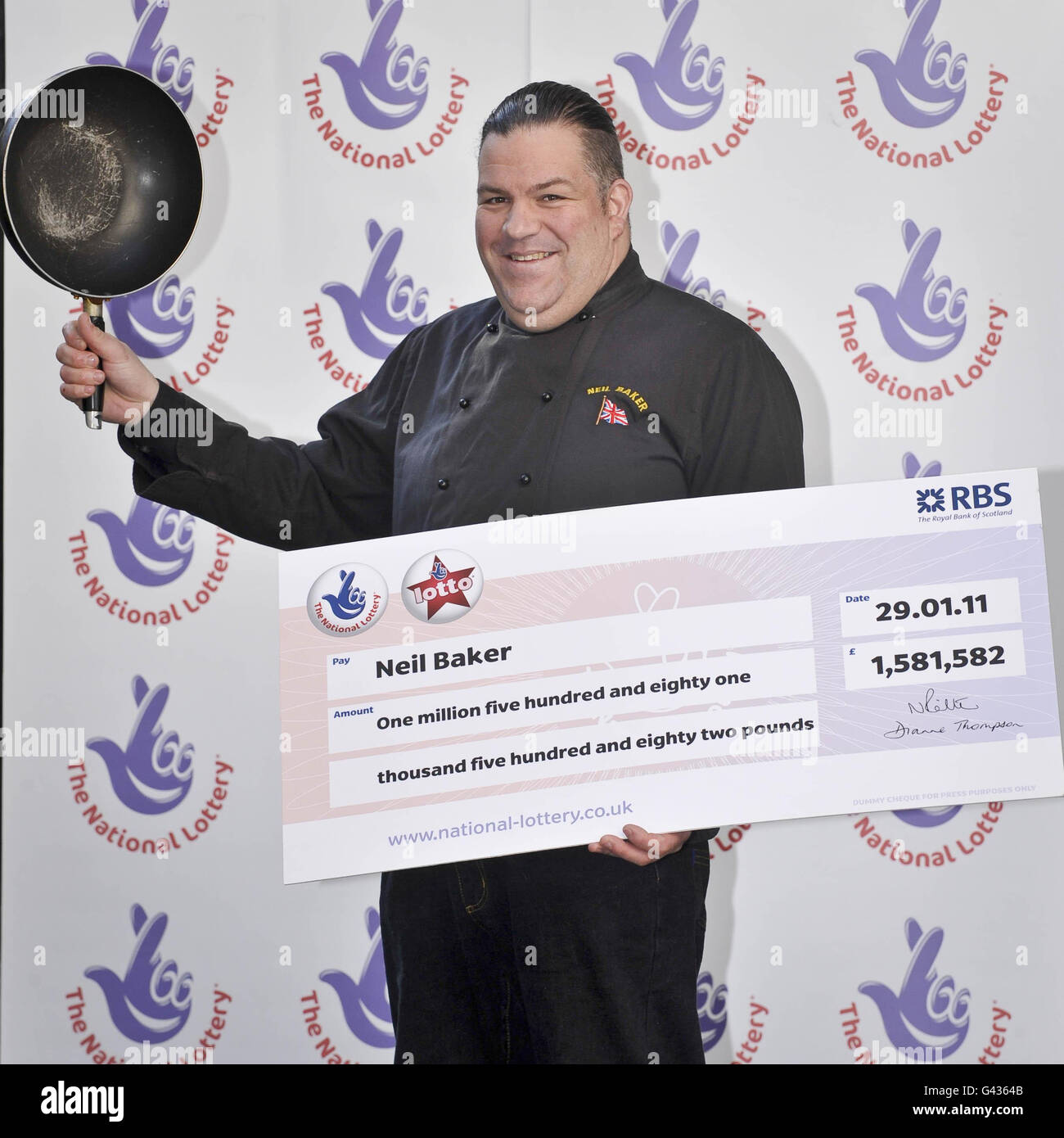 Lottery winner Neil Baker with a cheque for 1,581,582 at The Tudor, a ...