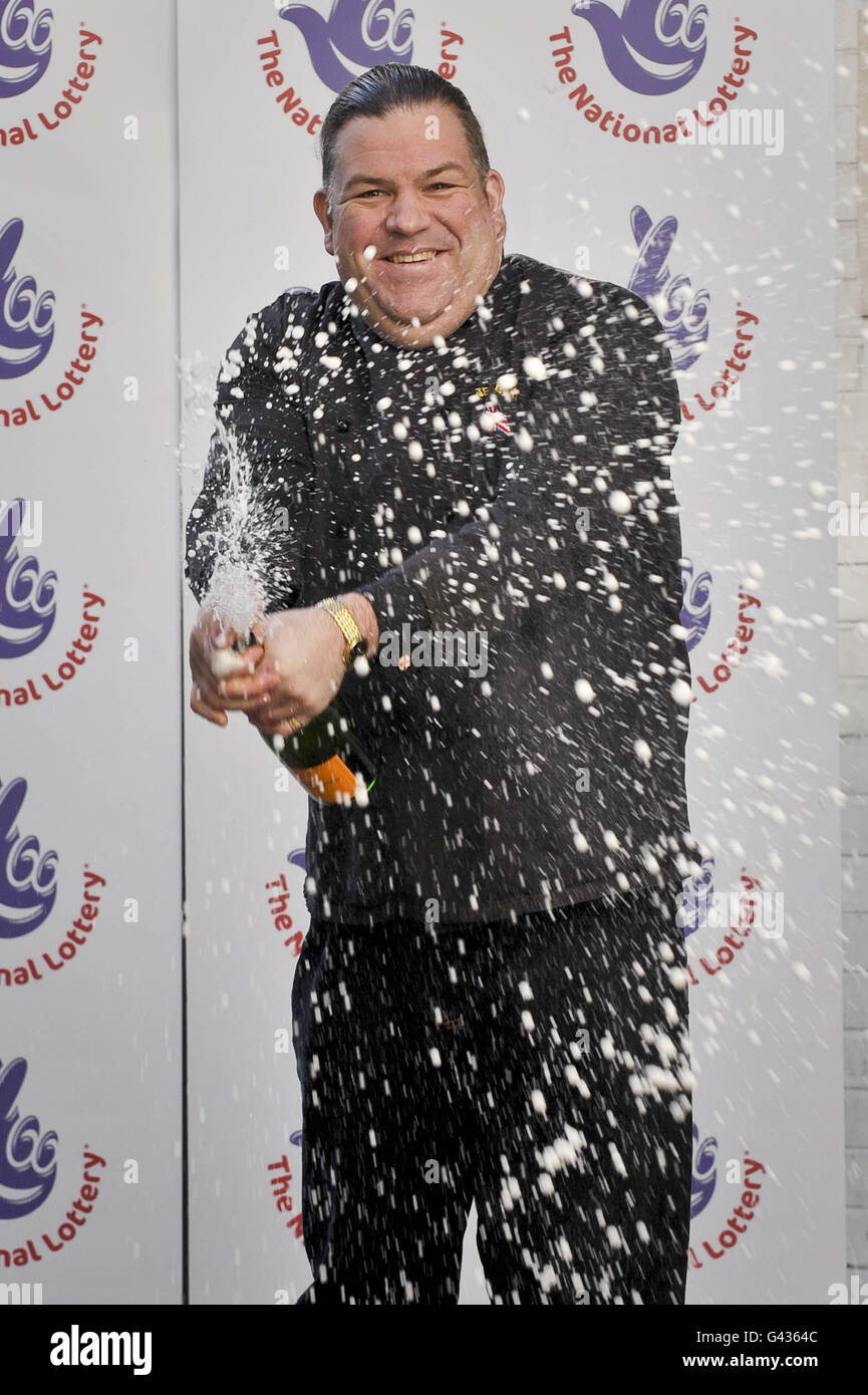 Lottery winner Neil Baker celebrates winning 1,581,582 at The Tudor, a ...