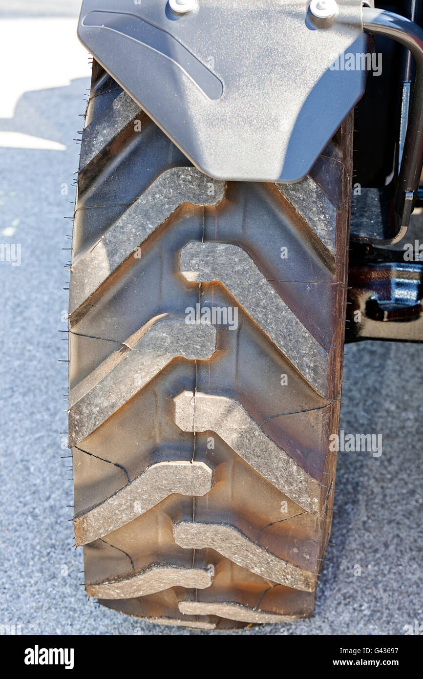 View on wheel of new excavator digging Stock Photo - Alamy