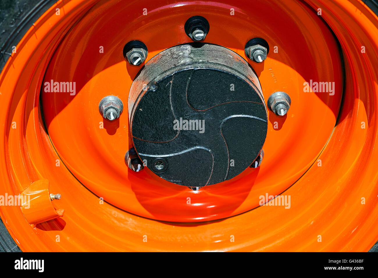 View on wheel of new excavator digging Stock Photo - Alamy