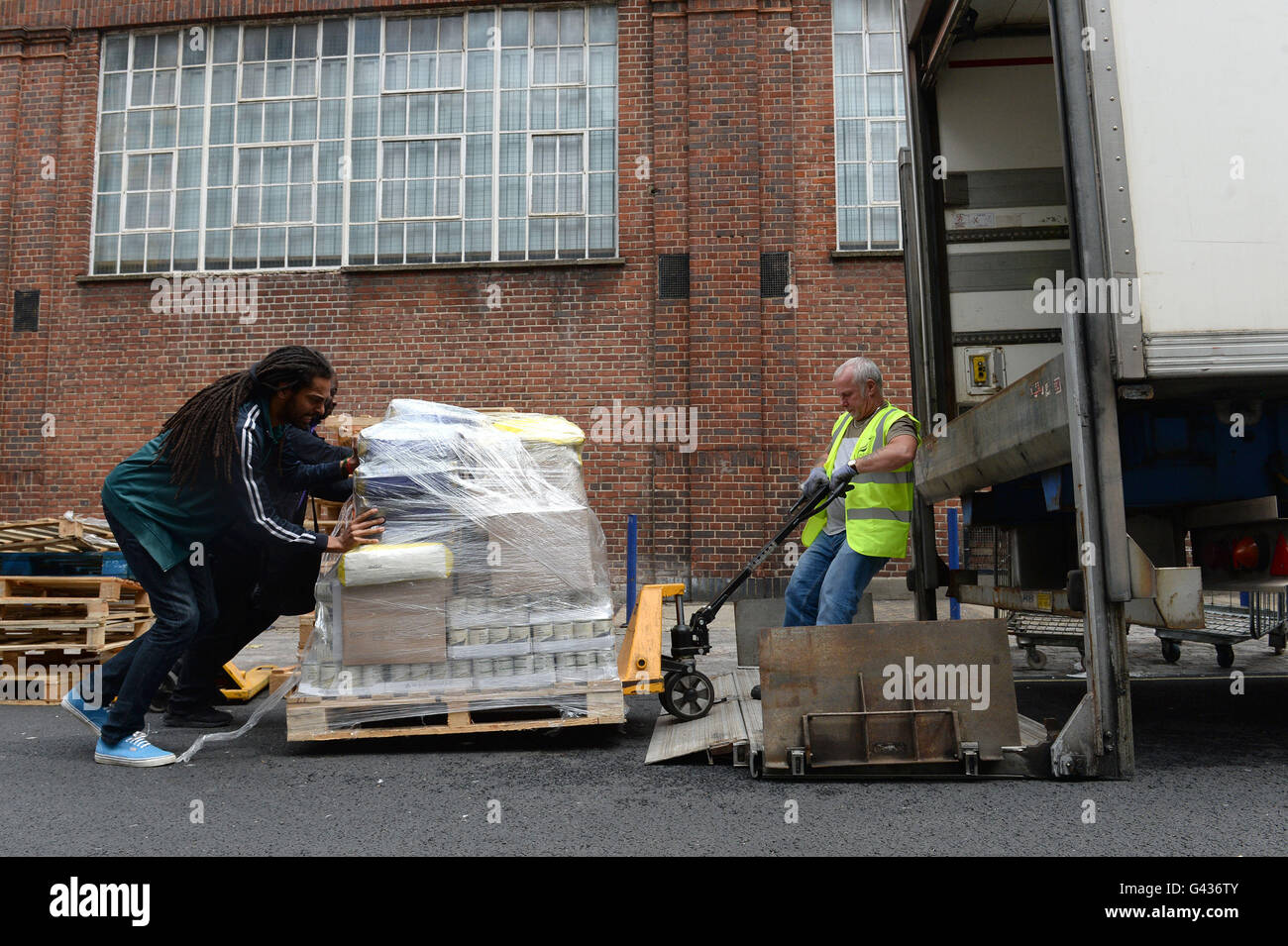Aid destined for refugees in Calais is loaded onto a lorry by ...