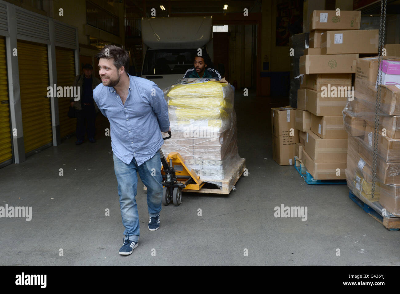 Aid destined for refugees in Calais is loaded onto a lorry by ...