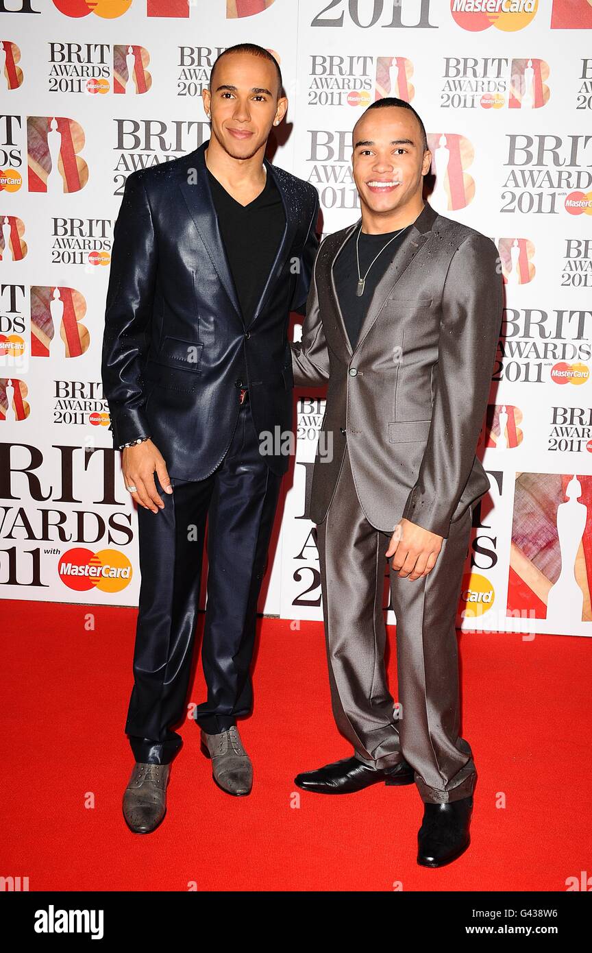 Lewis Hamilton and his brother Nick Hamilton arriving for the 2011 Brit ...