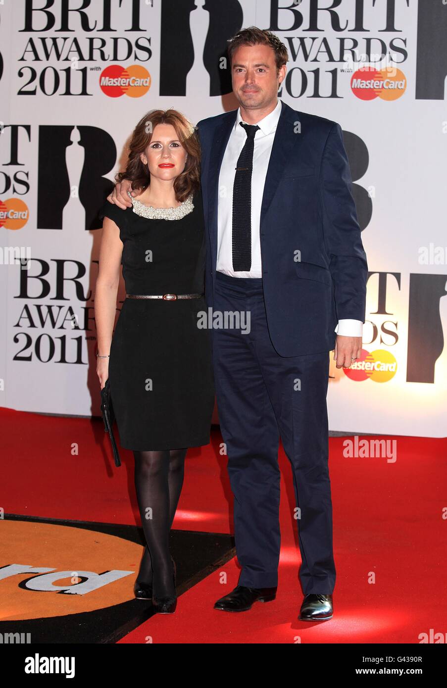 Jamie Theakston and his wife Sophie arriving for the 2011 Brit Awards ...