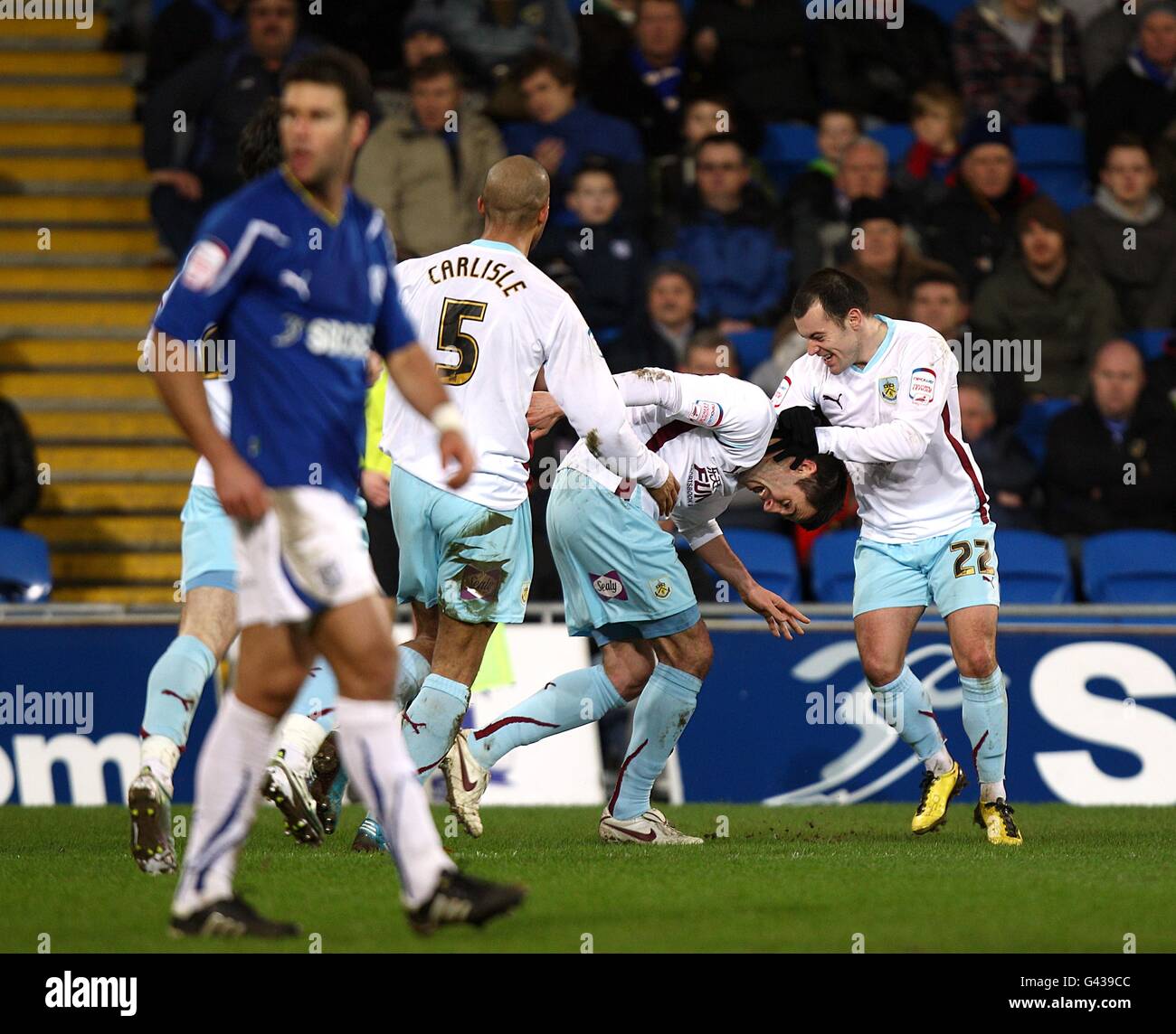 Burnley's Steven Thompson (second right) celebrates scoring his team's ...