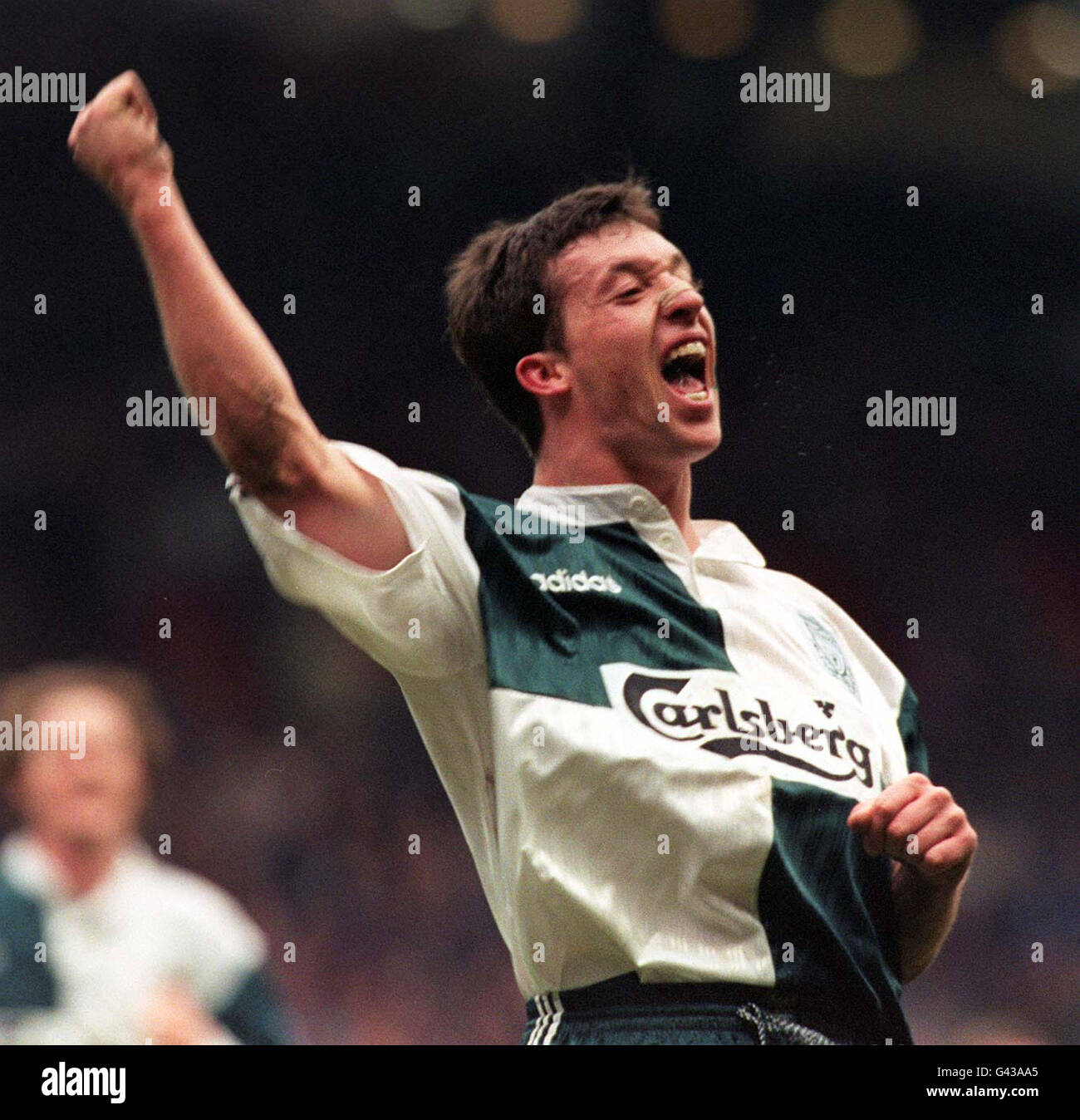 Robbie Fowler celebrates his second goal for Liverpool who knocked ...