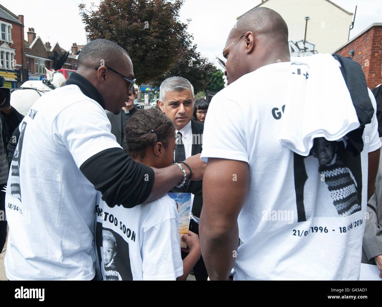 Mayor of London Sadiq Khan (centre) meets the family of Lewis Elwin ...
