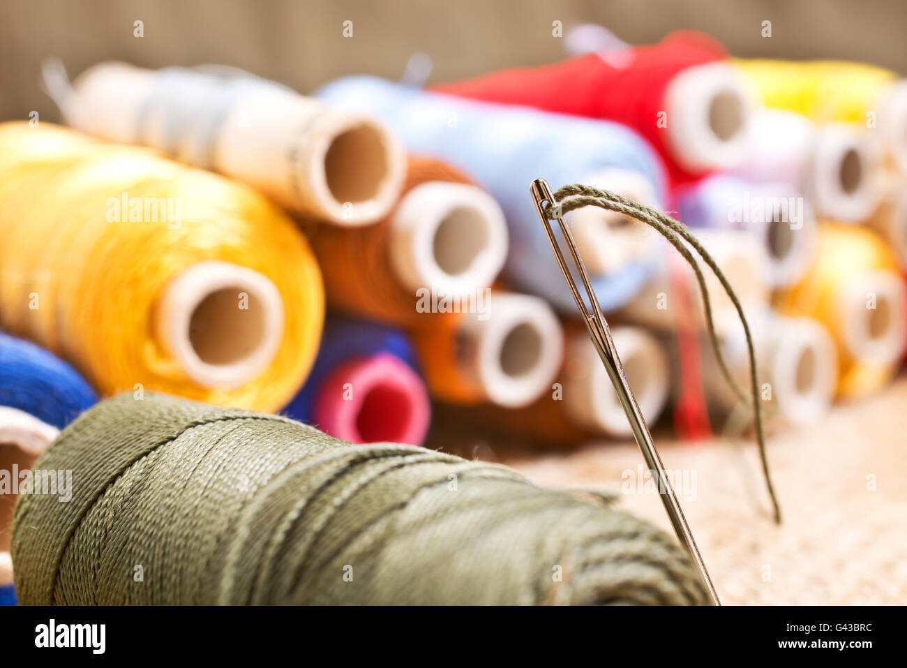 detail of sewing kit in the workroom Stock Photo - Alamy