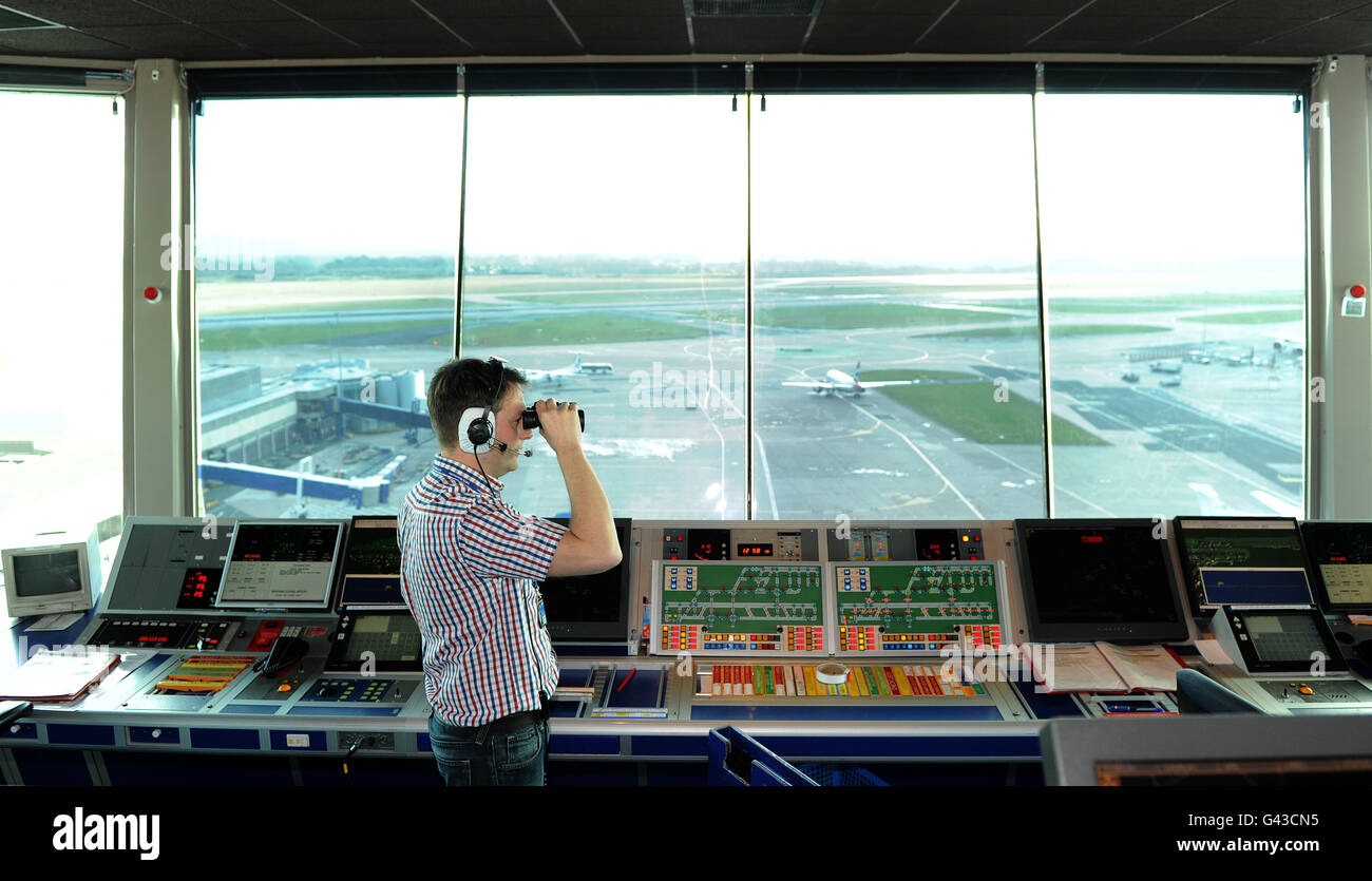 A generic stock image of air traffic controllers at work in the control ...