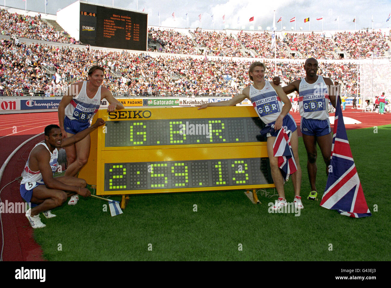 The Great Britain relay team celebrate with Union flags infront of the ...