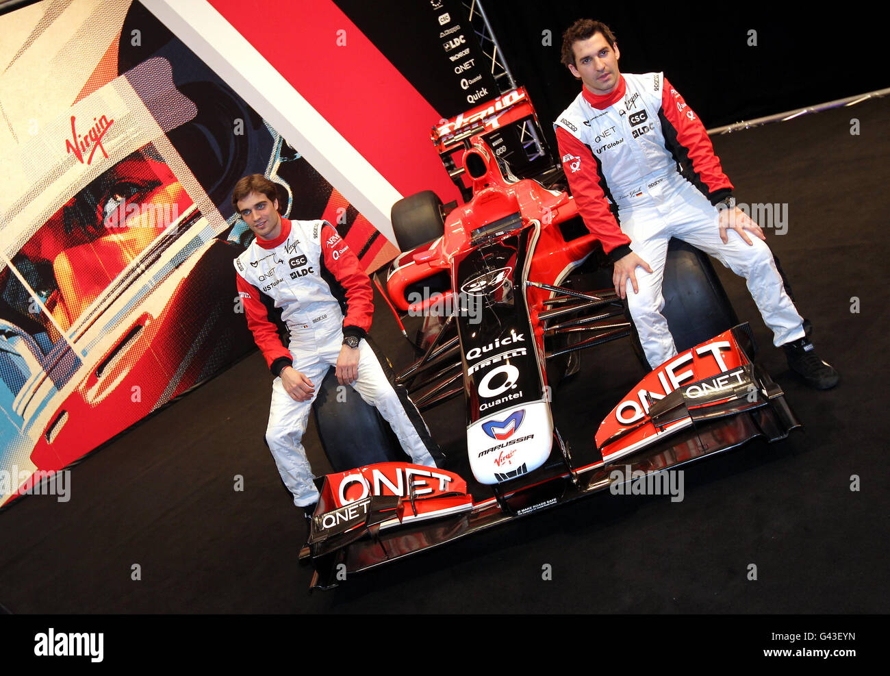 Drivers Timo Glock and Jerome d'Ambrosio (left) pose with the new ...