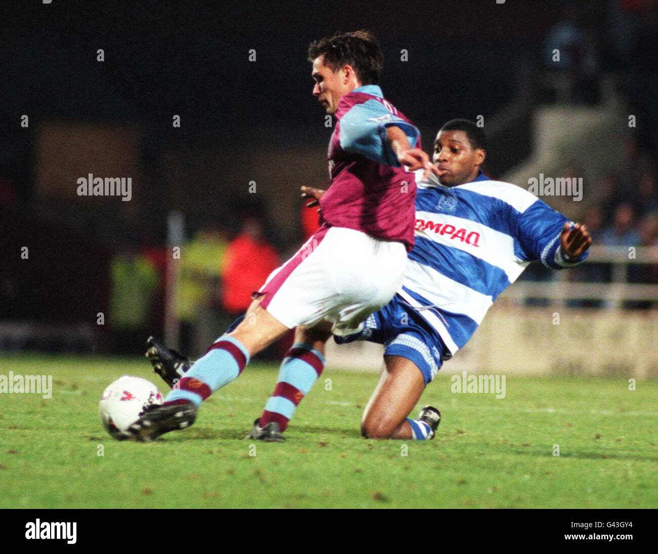 West Ham's Steve Potts (left) during a sliding tackle with QPR's Andy ...