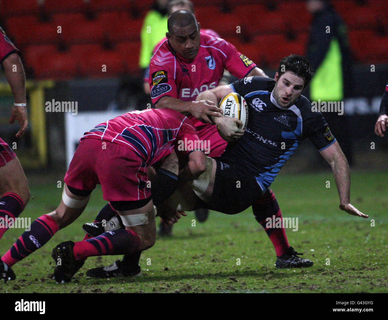 Glasgow's Johnnie Beattie and Cardiff's Paul Tito and Ma'ama Molitika ...