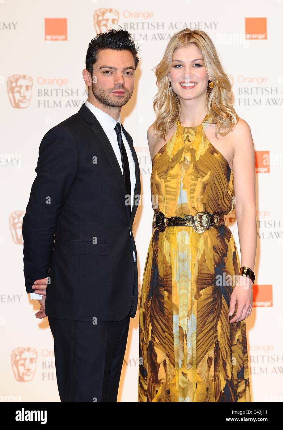 Dominic Cooper and Rosamund Pike in the press room at the 2011 Orange ...