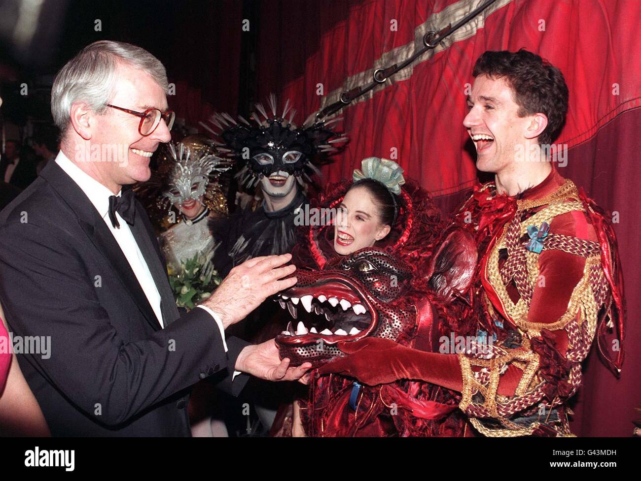 Prime Minister John Major feels the magnificent costume head of Royal ...