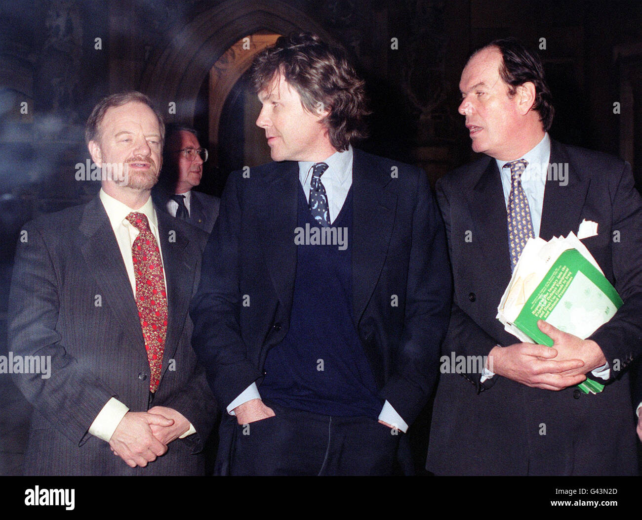 Labour MP Robin Cook (left) leaving the House of Commons the evening ...
