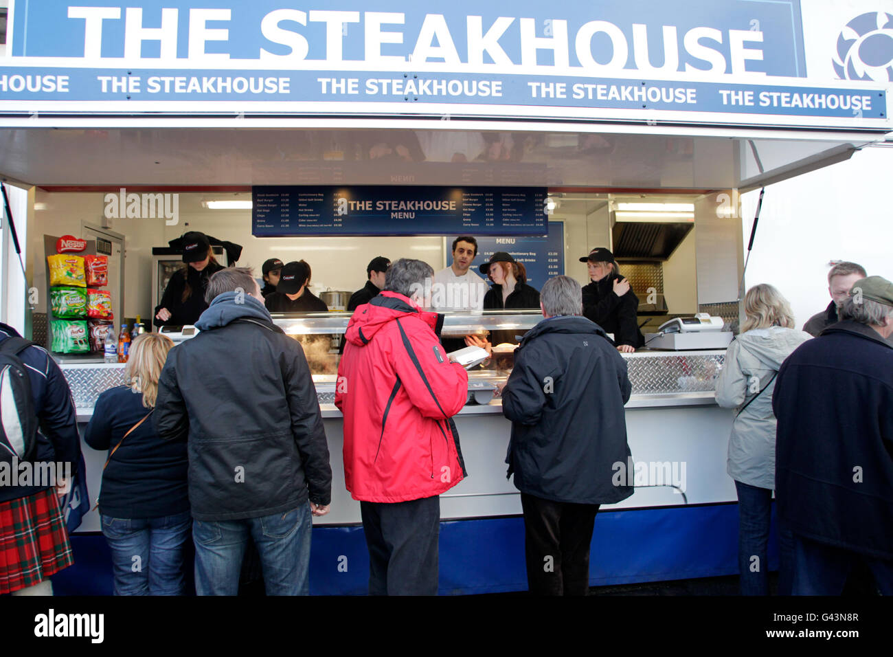 Fans visit the steakhouse food outlet outside of Murrayfield Stock ...