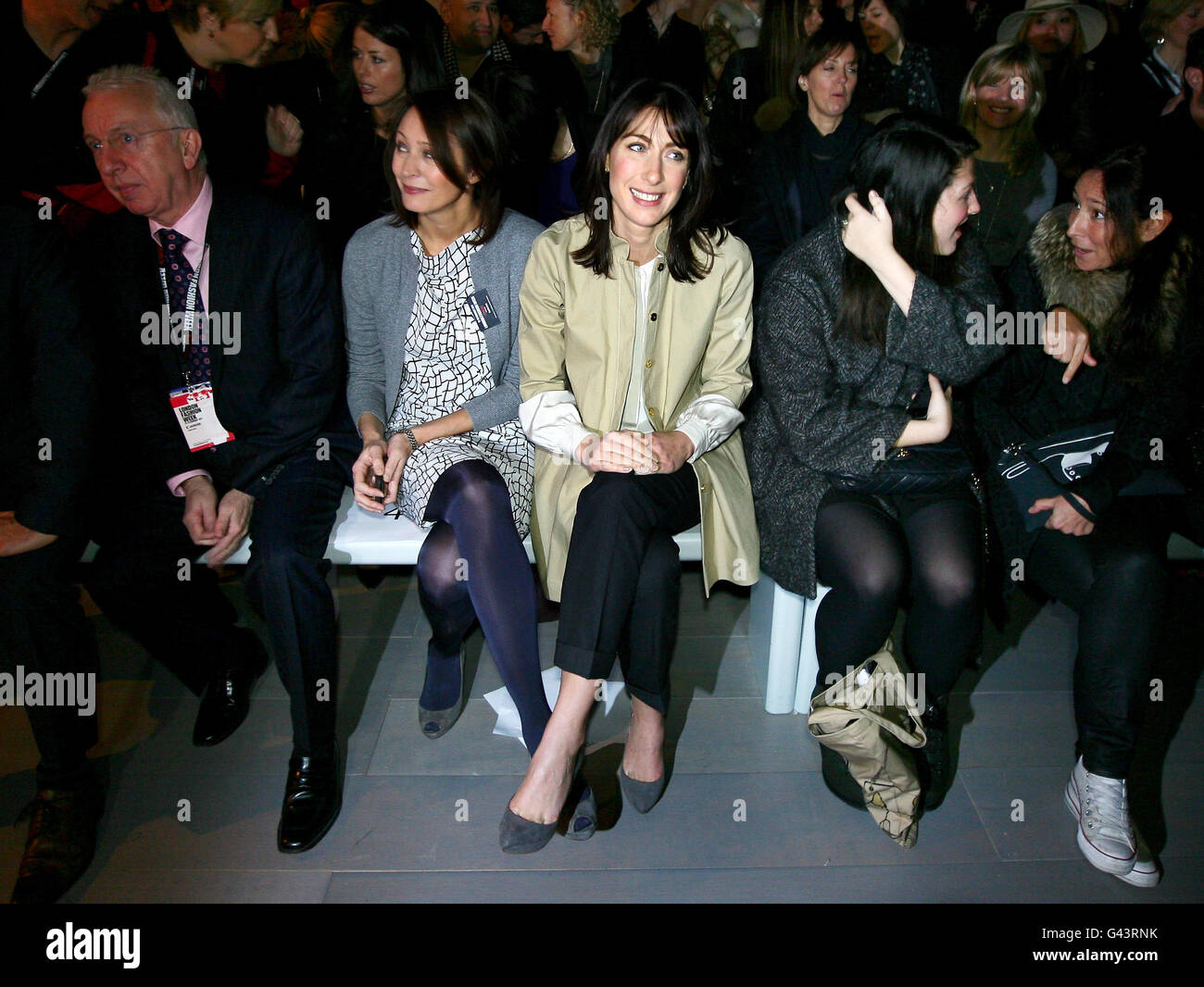 Samantha Cameron (beige jacket) watches the David Koma catwalk show ...