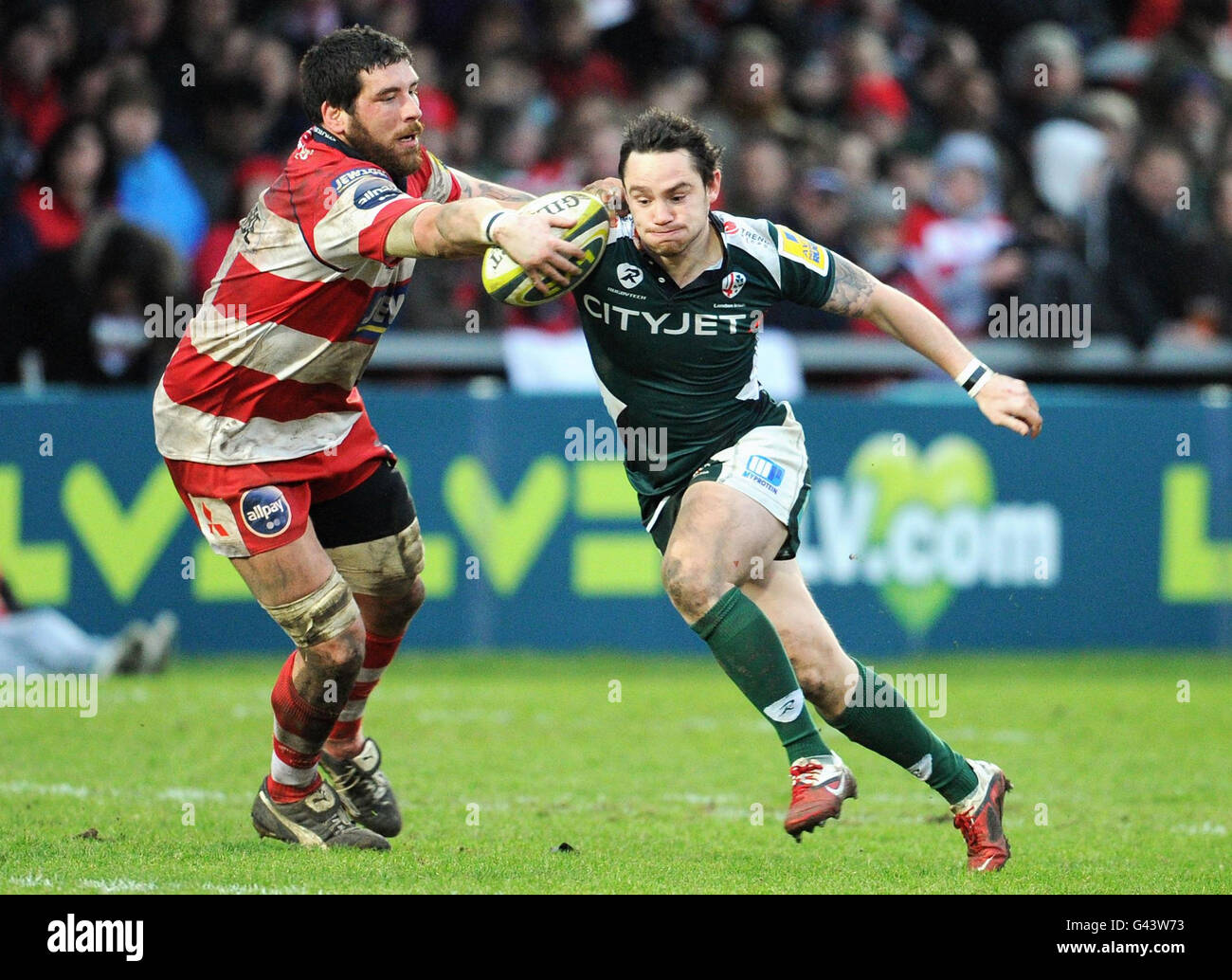 Rugbyu london irish full length tackling mangsm hi-res stock ...