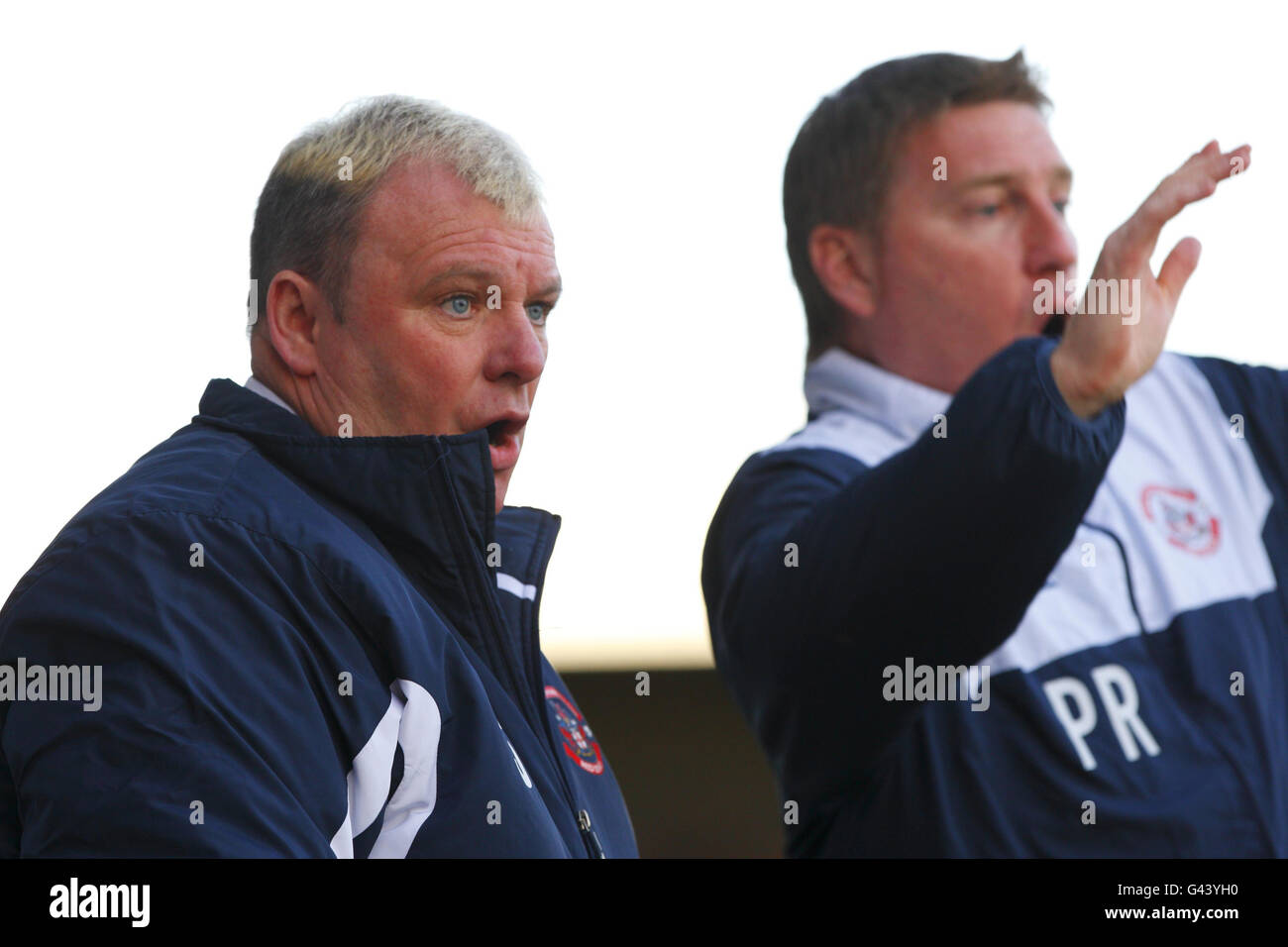 Crawley Town manager Steve Evans and his assistant Paul Raynor (right ...