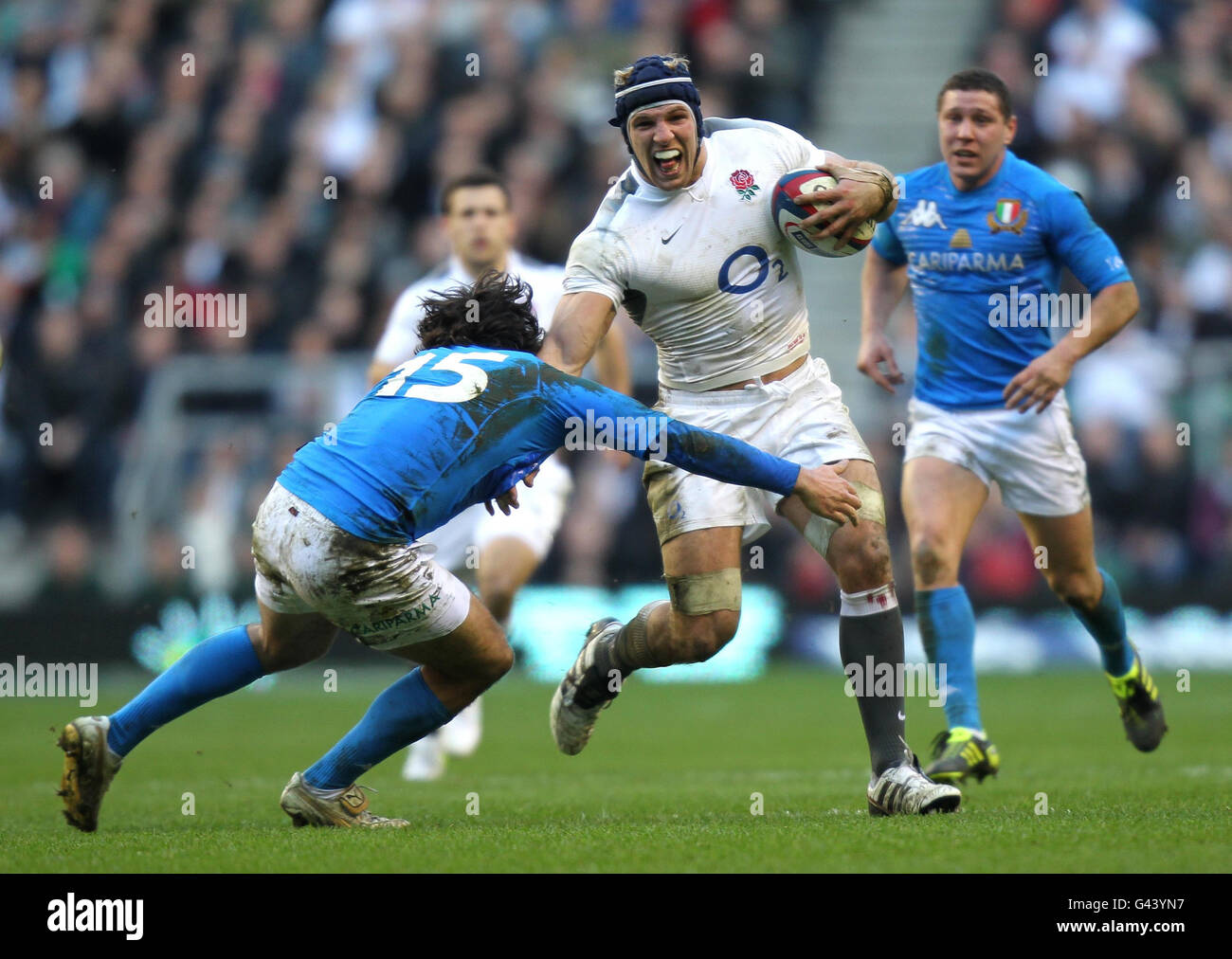 England's James Haskell is tackled by Italy's Luke McLean during the ...