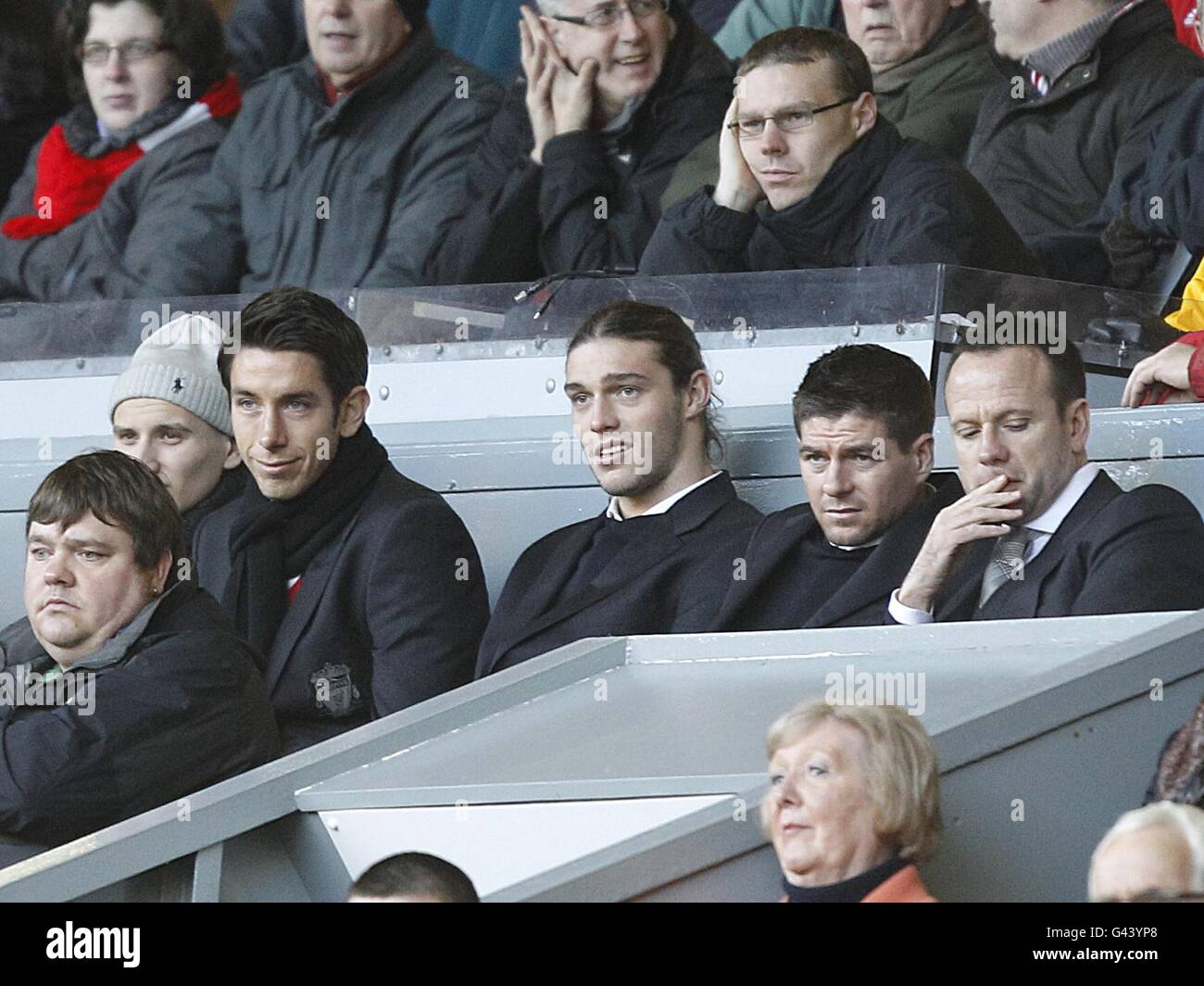 Liverpool's Andy Carroll (centre) and Steven Gerrard (2nd right) in the ...