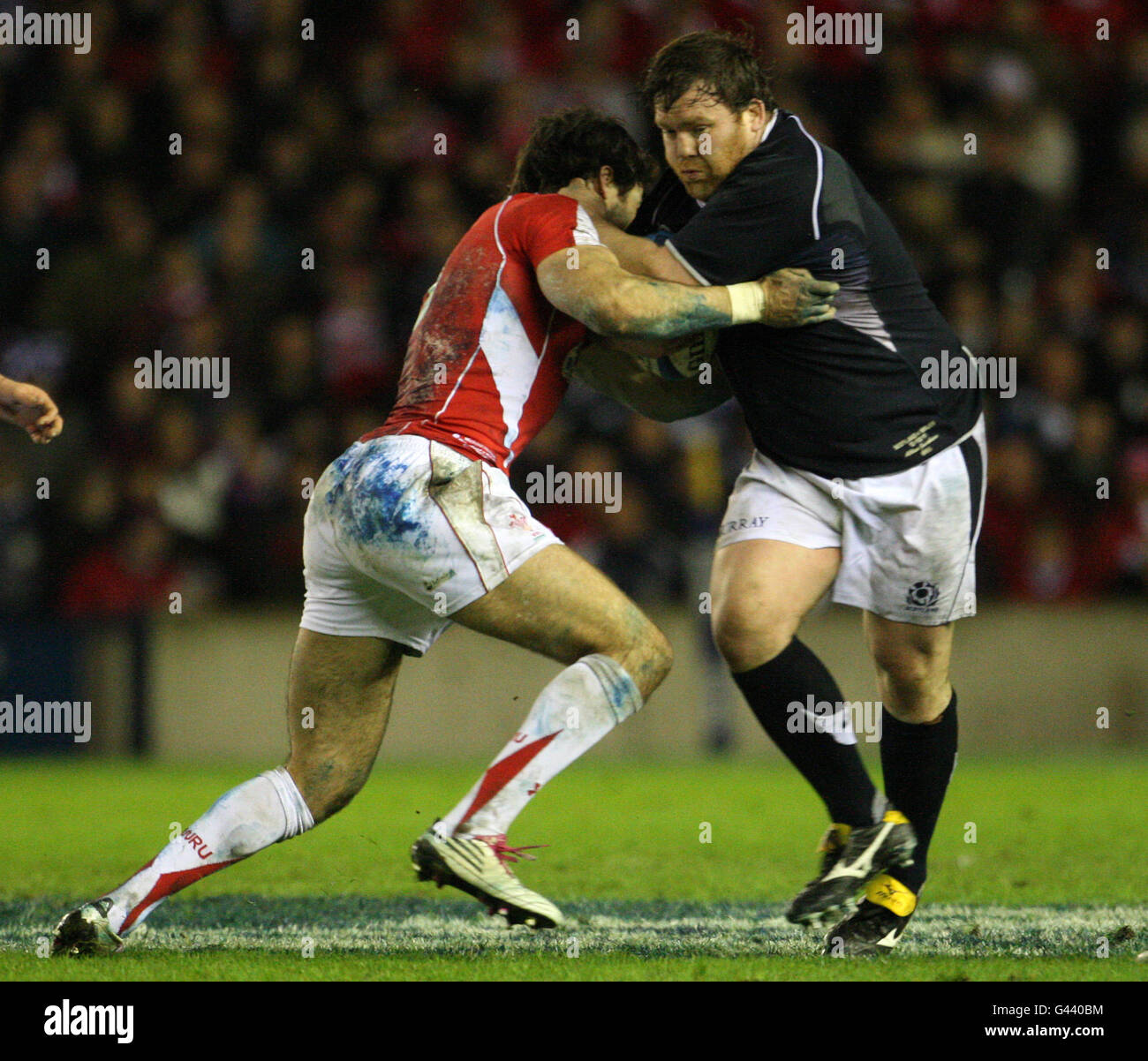 Scotland's Allan Jacobsen and Wales's Mike Phillips dduring the RBS 6 ...