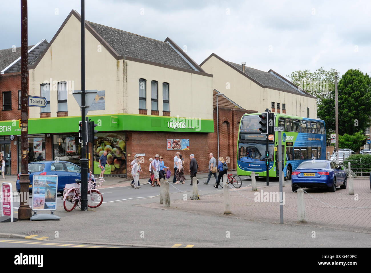 Busy town center view of a popular supermarket seen on the corner of a ...