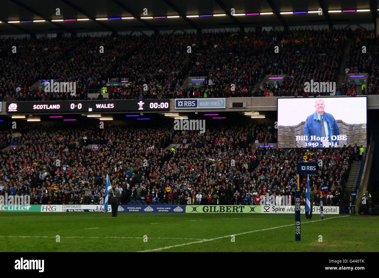 A tribute of Bill Hogg OBE is shown on the giant screen Stock Photo - Alamy