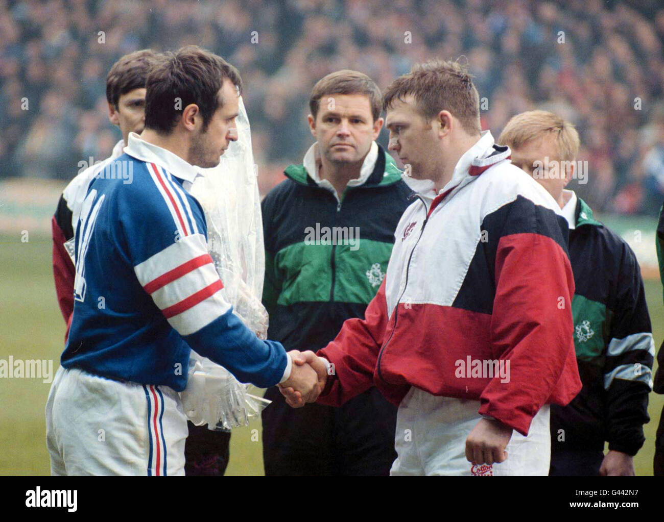 French Captain Phillipe Saint Andre hands flowers to Welsh Captain ...