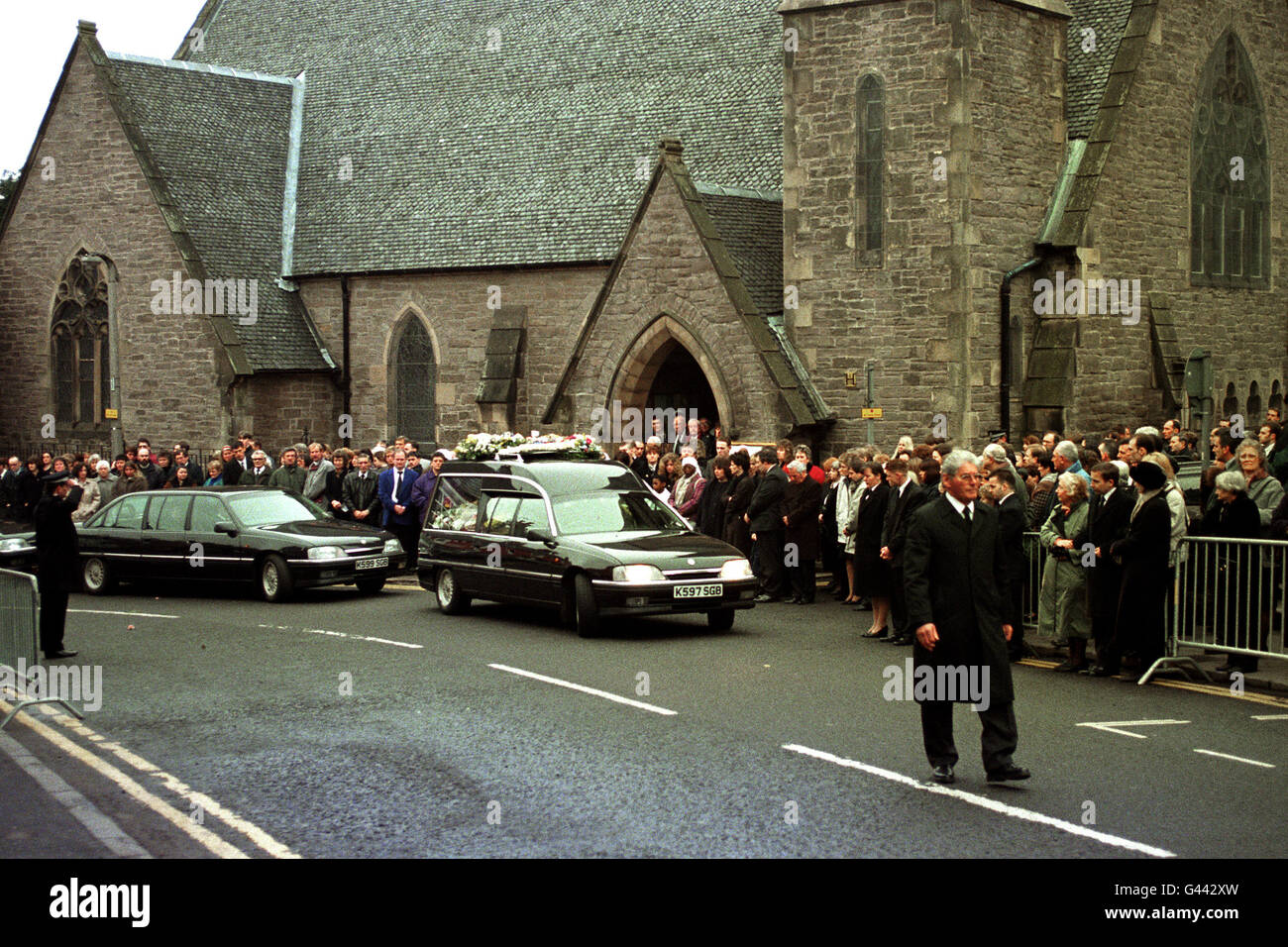 The funeral cortege of Kevin Hassel makes it way through the streets of ...