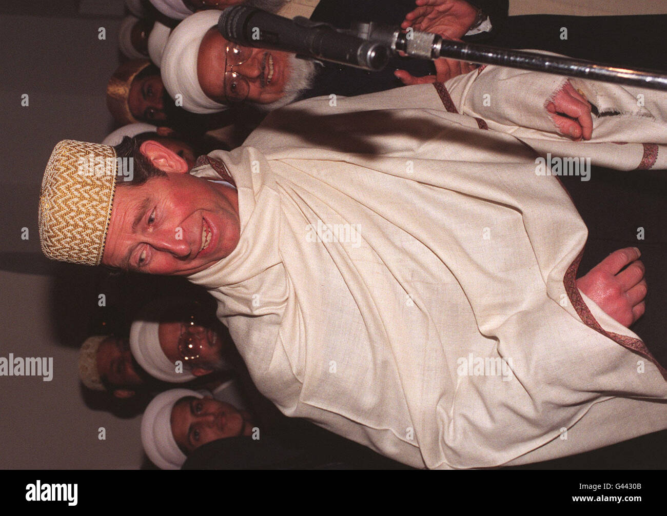 The Prince of Wales wearing traditional cap and shawl during a visit to ...