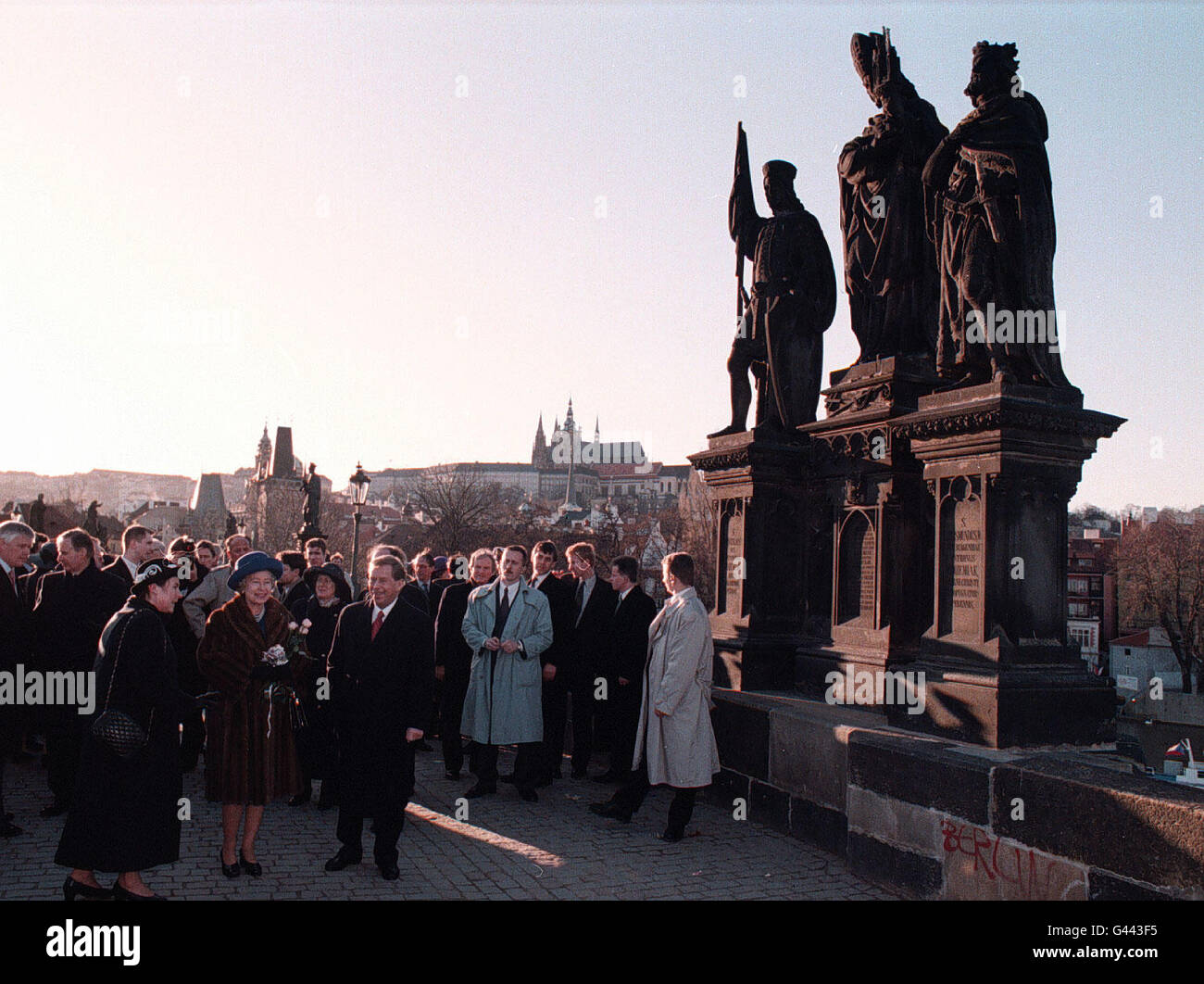 The Queen and President Havel smile at the large crowds beneath the ...