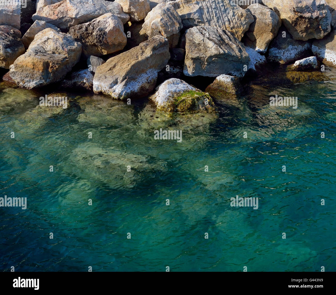 Big rocks in water Stock Photo - Alamy