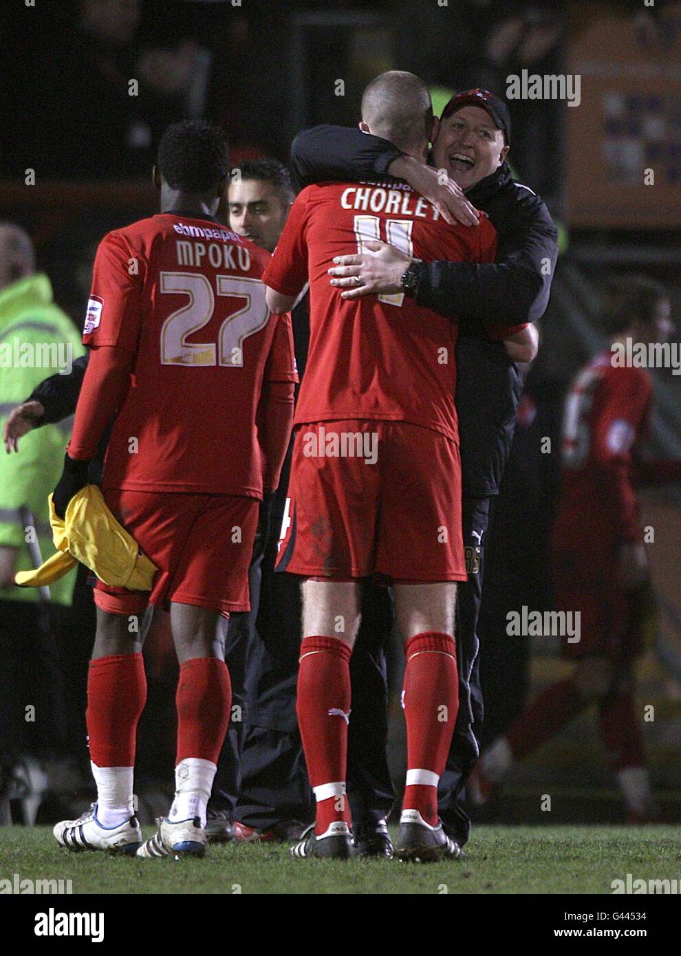 Leyton Orient manager Russell Slade (right) celebrates with Ben Chorley ...