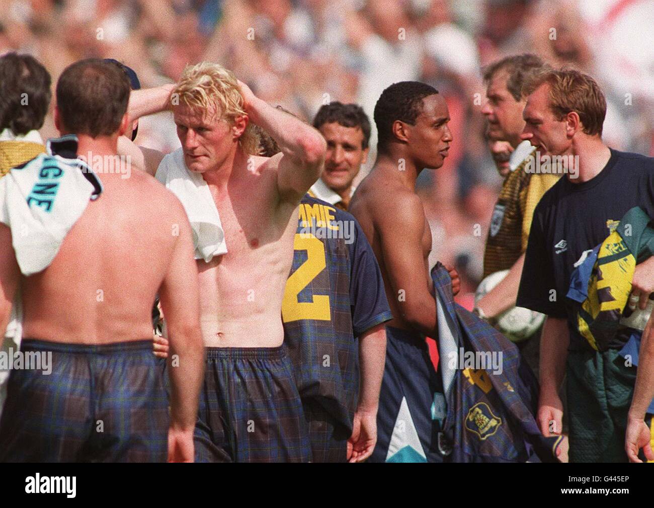 Scotland's Colin Hendry (2nd left) with his hands on his head following ...