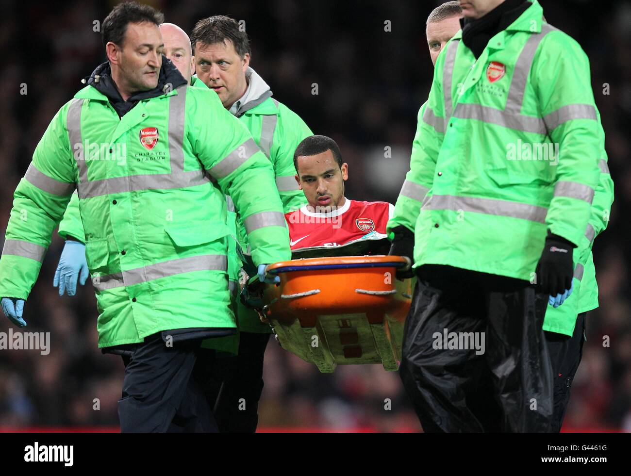Arsenal's Theo Walcott is stretchered off after receiving an injury ...